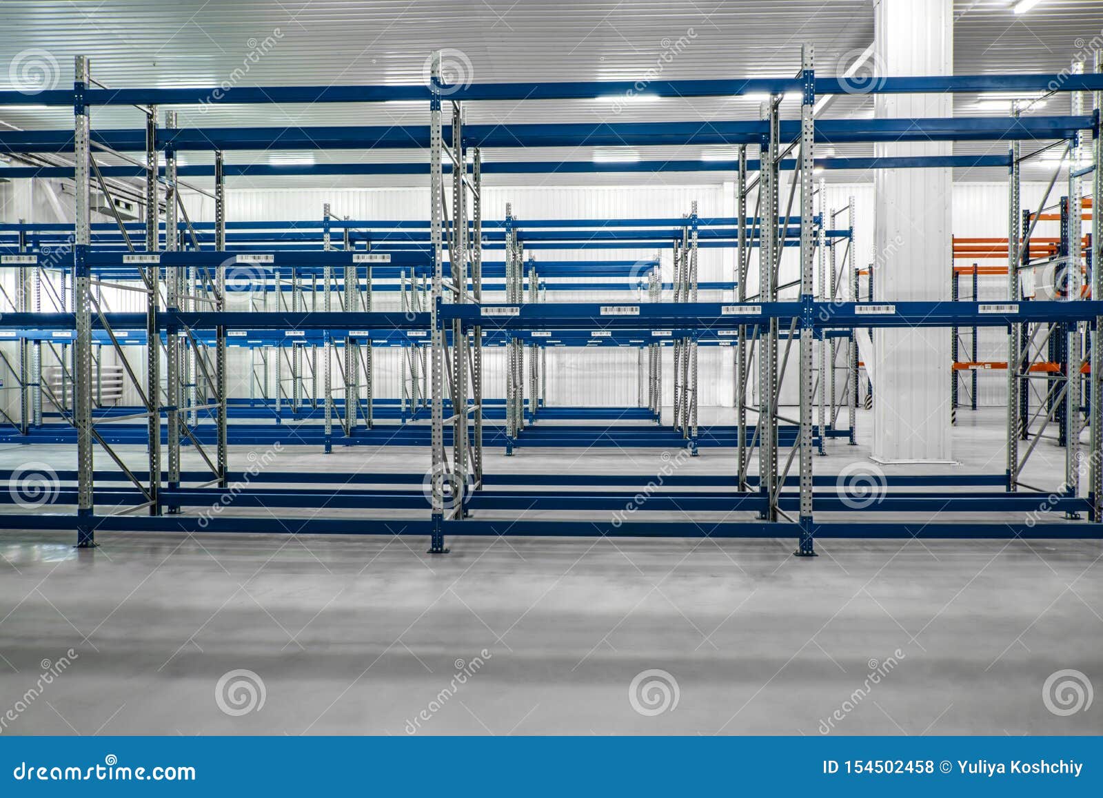 Empty Warehouse Shelves in Grey Industrial Interior Stock Photo - Image ...