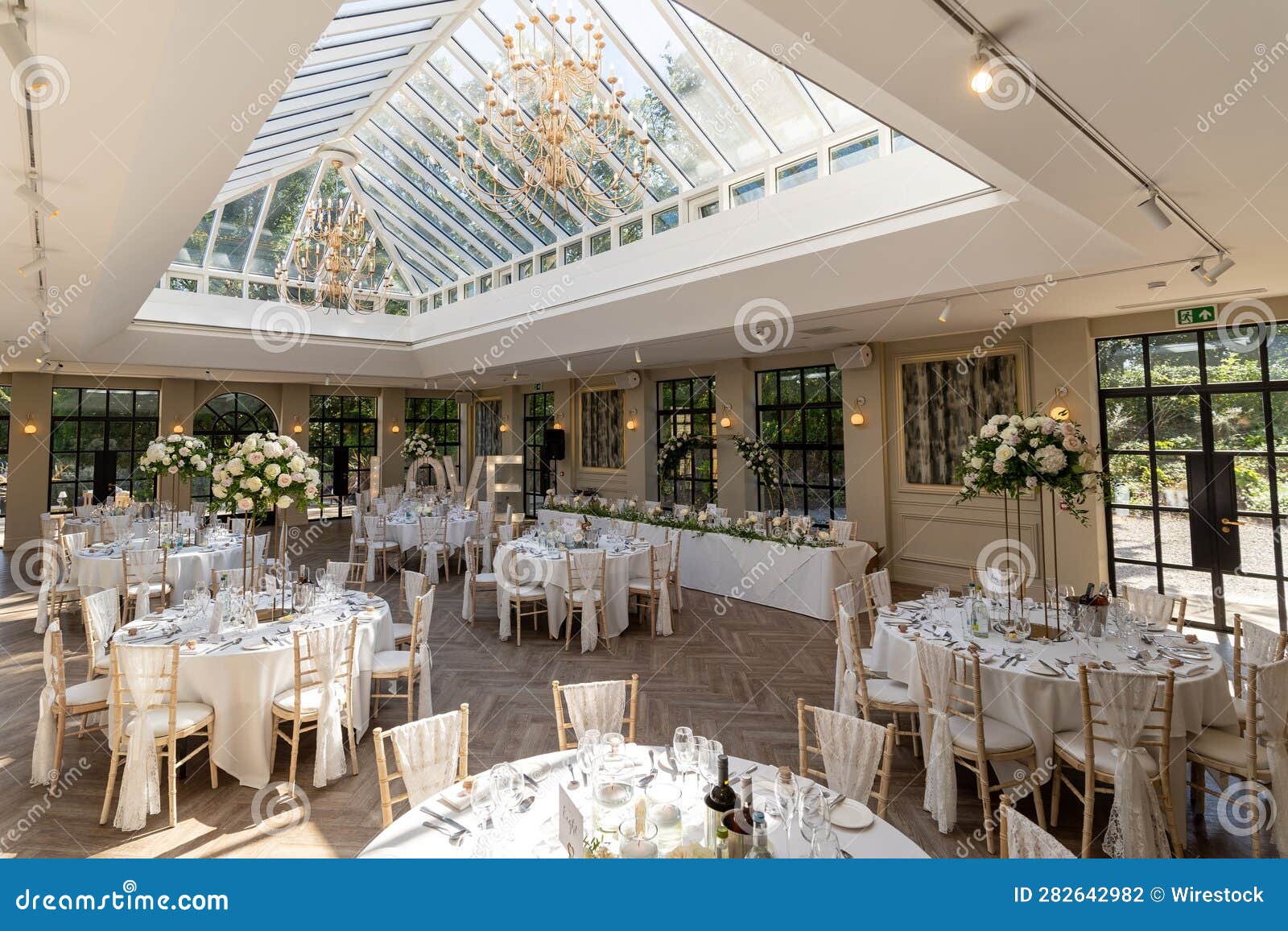 Empty Wedding Reception Area Set Up with Tables, Ready for Guests To ...