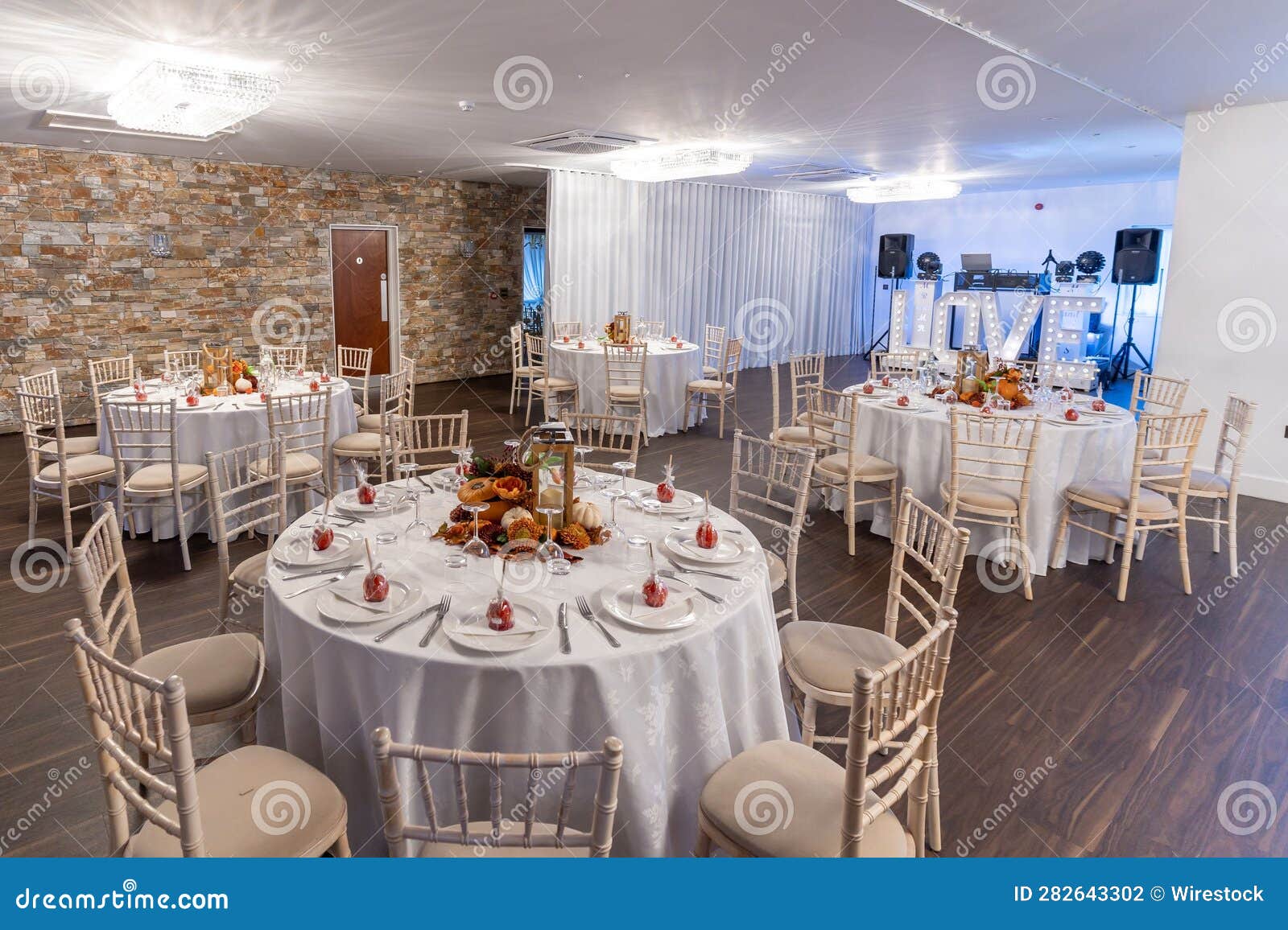 Empty Wedding Reception Area Set Up with Tables, Ready for Guests To ...