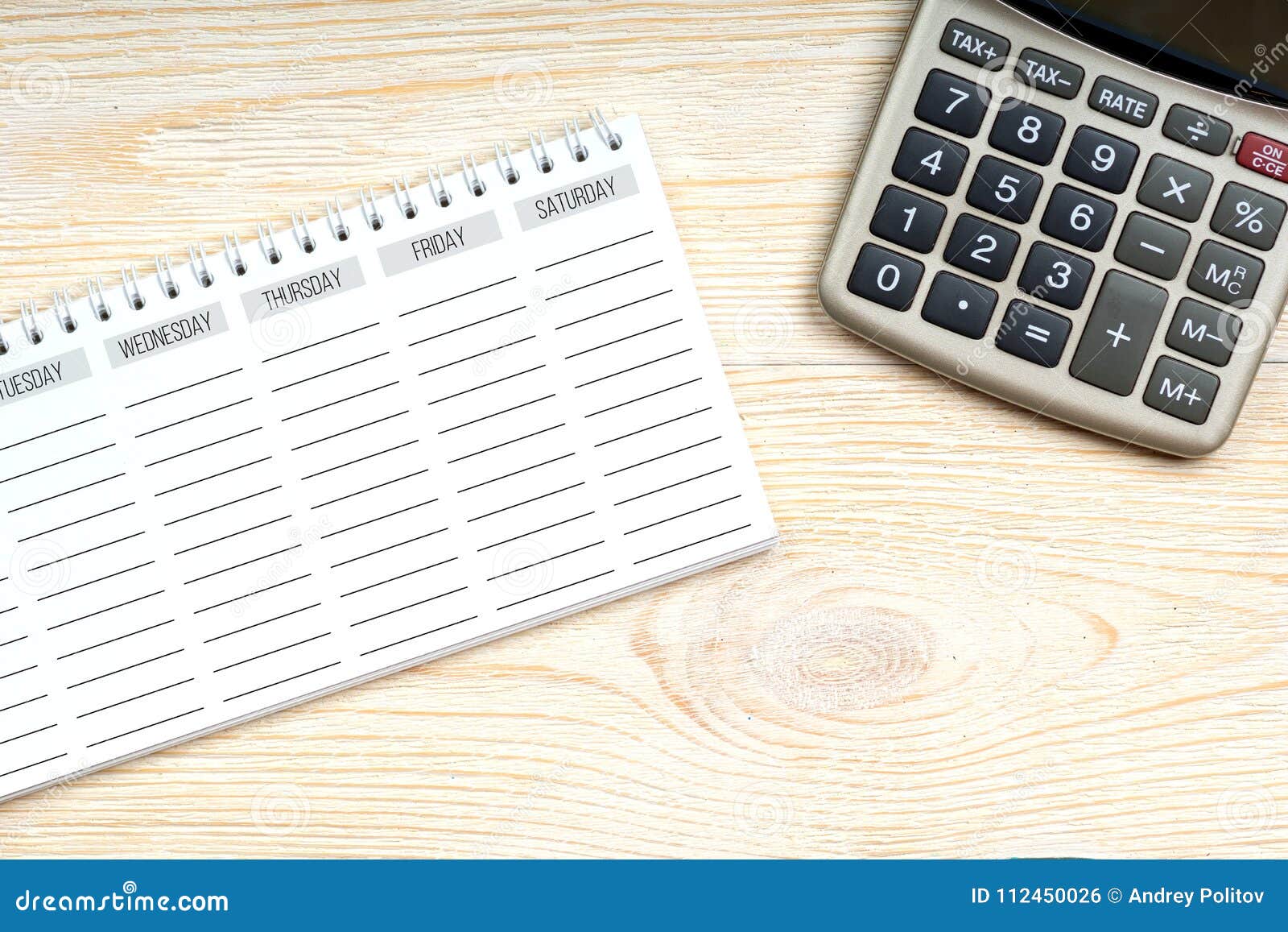 Empty Week Planner with Calculator on Office Table Stock Photo - Image ...