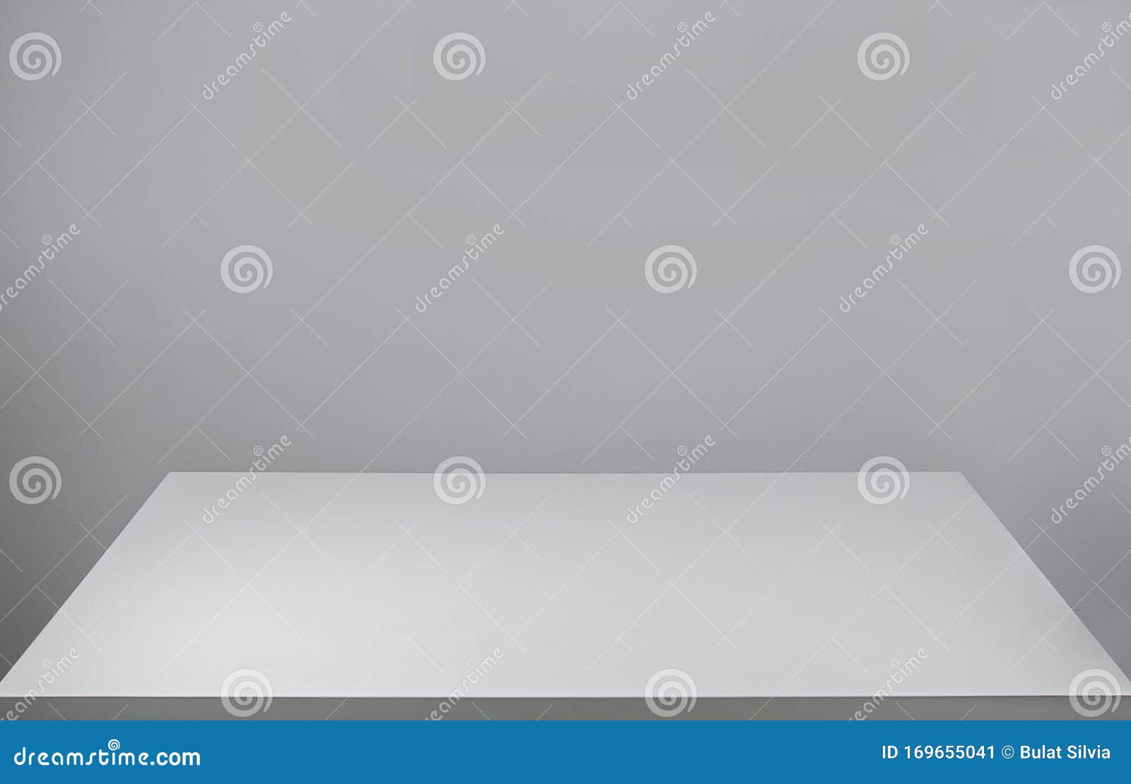 Empty White Desk Table and a Blank Grey Wall for Copy Space. Graphic ...