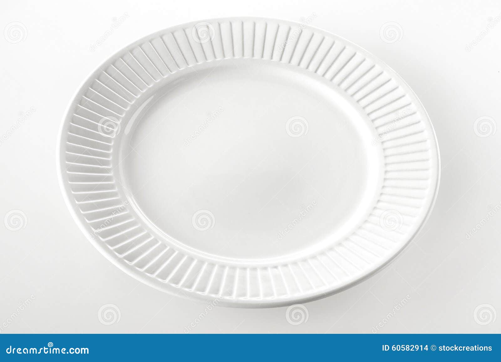 Empty White Dinner Plate with Ridged Rim Stock Photo - Image of angle ...