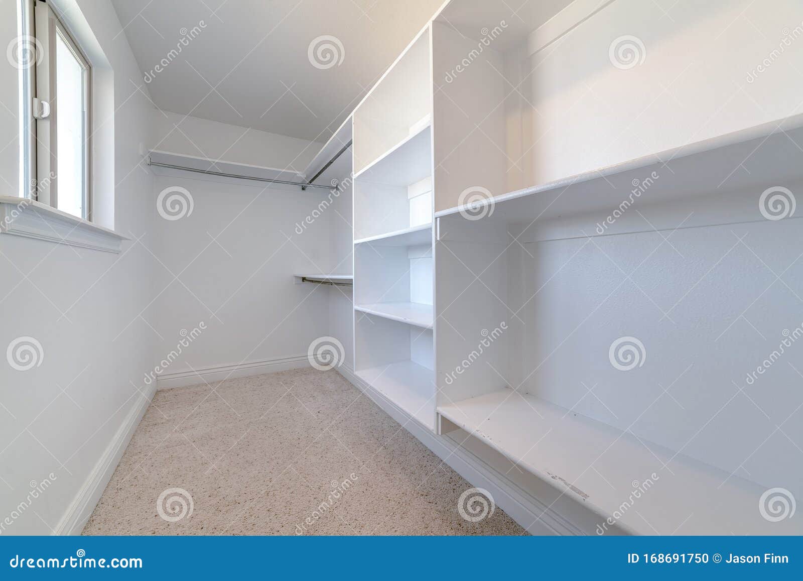 Empty White Fitted Interior of Walk-in Wardrobe Stock Photo - Image of ...