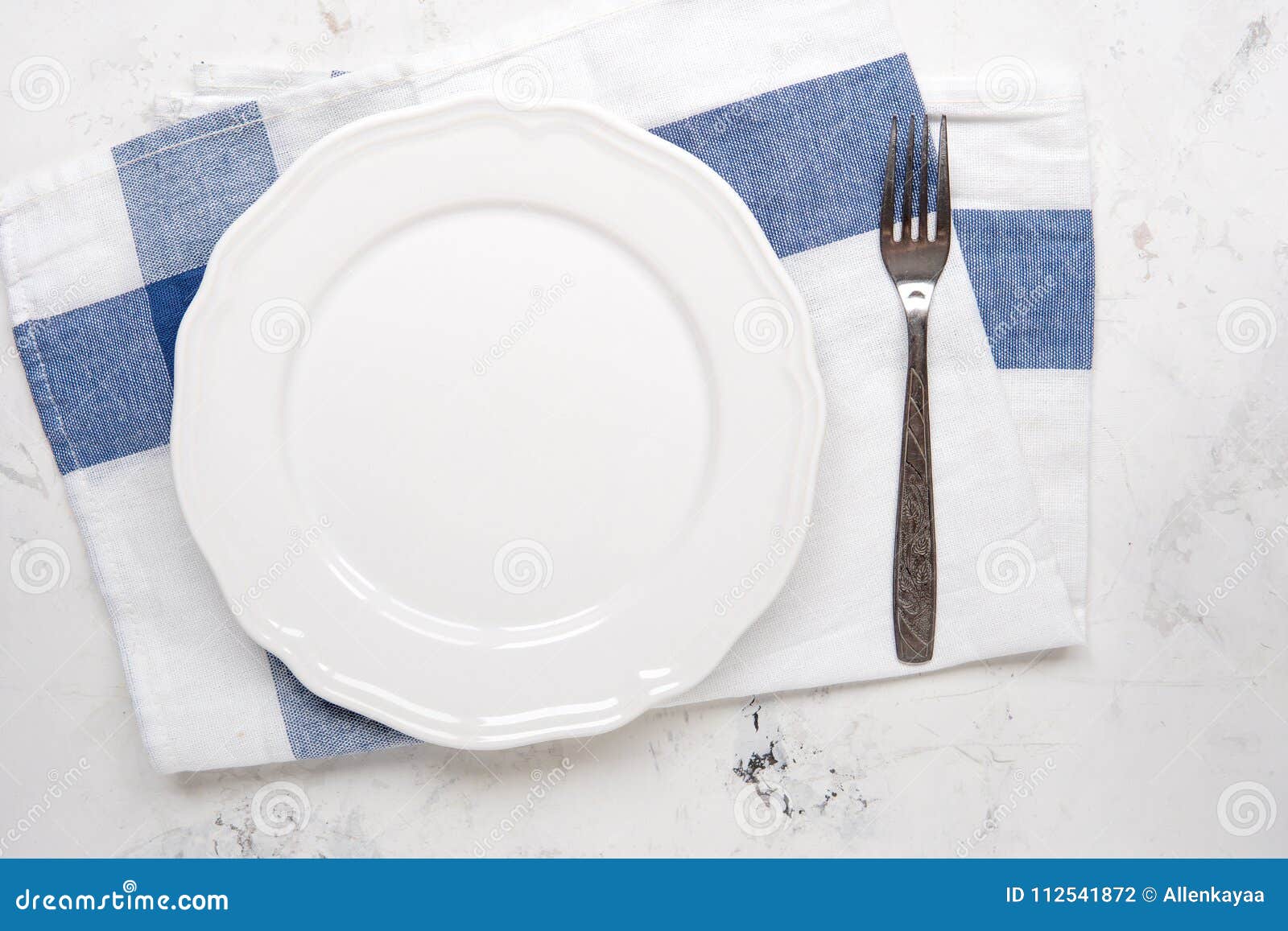 Empty White Plate and Fork on a Table, Top View Stock Photo - Image of ...
