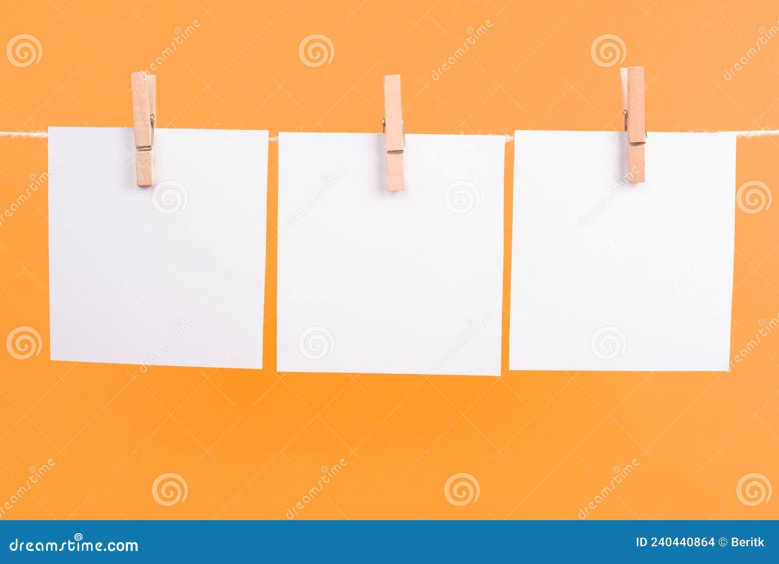 Empty White Sheets of Paper in a Row Hanging on a String, Copy Space ...