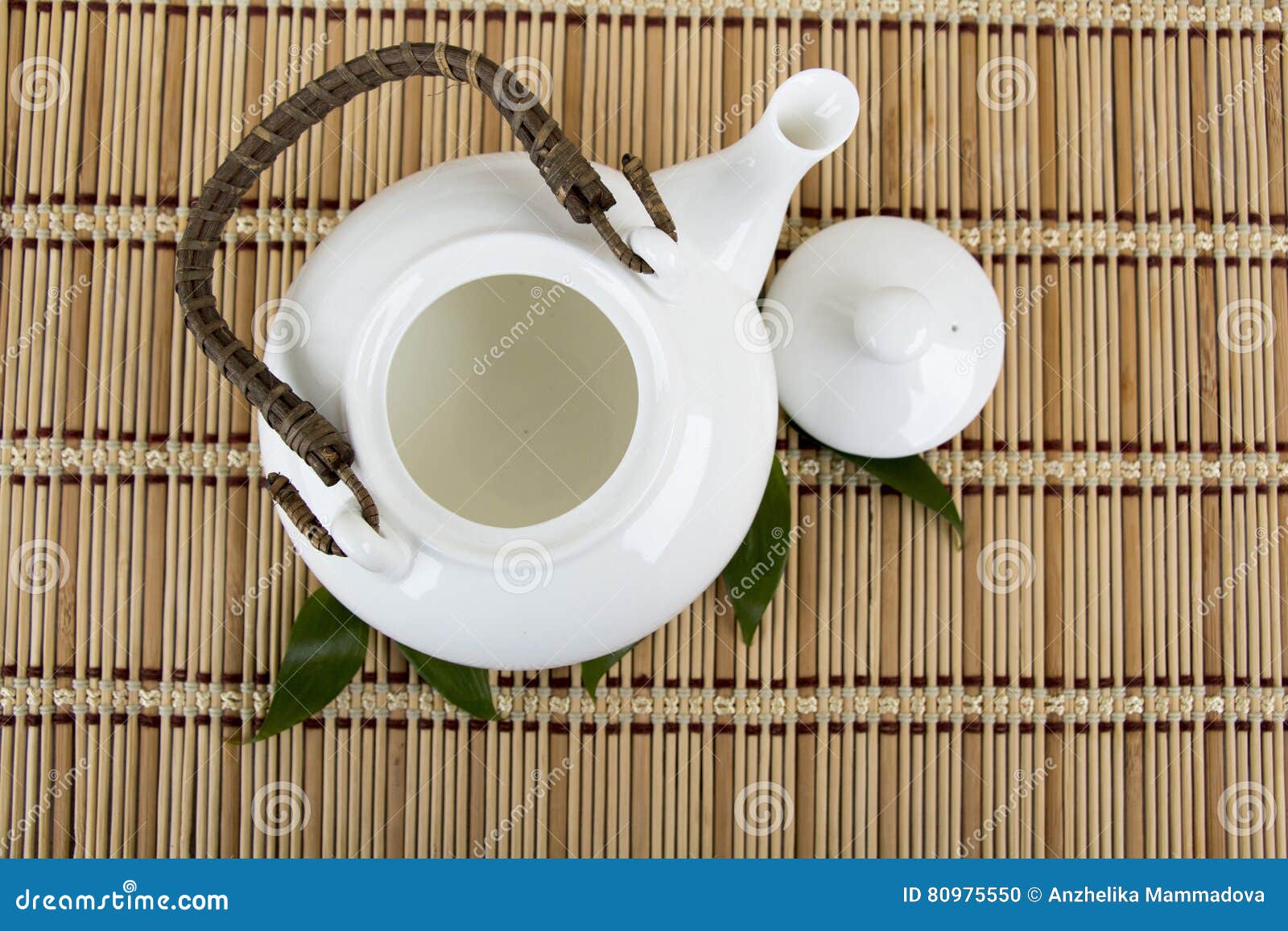 Empty White Teapot on Bamboo Mat Plate. Top View Stock Photo - Image of ...