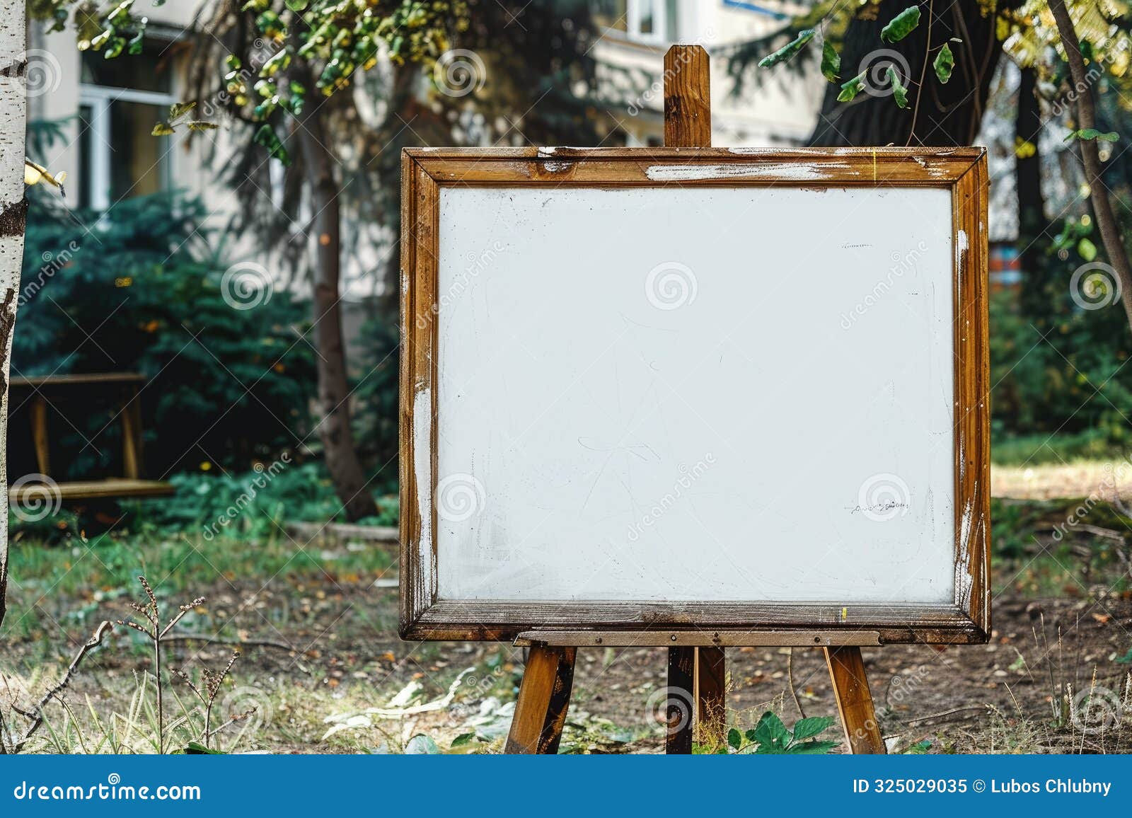 An Empty Whiteboard Placed on a Wooden Easel Outside among Trees Stock ...