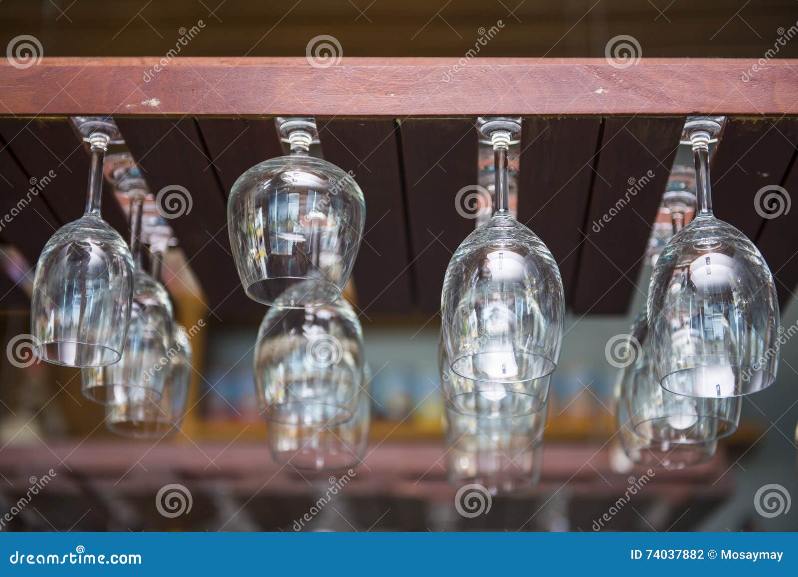 Empty Wine Glasses Hanging Over the Bar Stock Photo - Image of ...