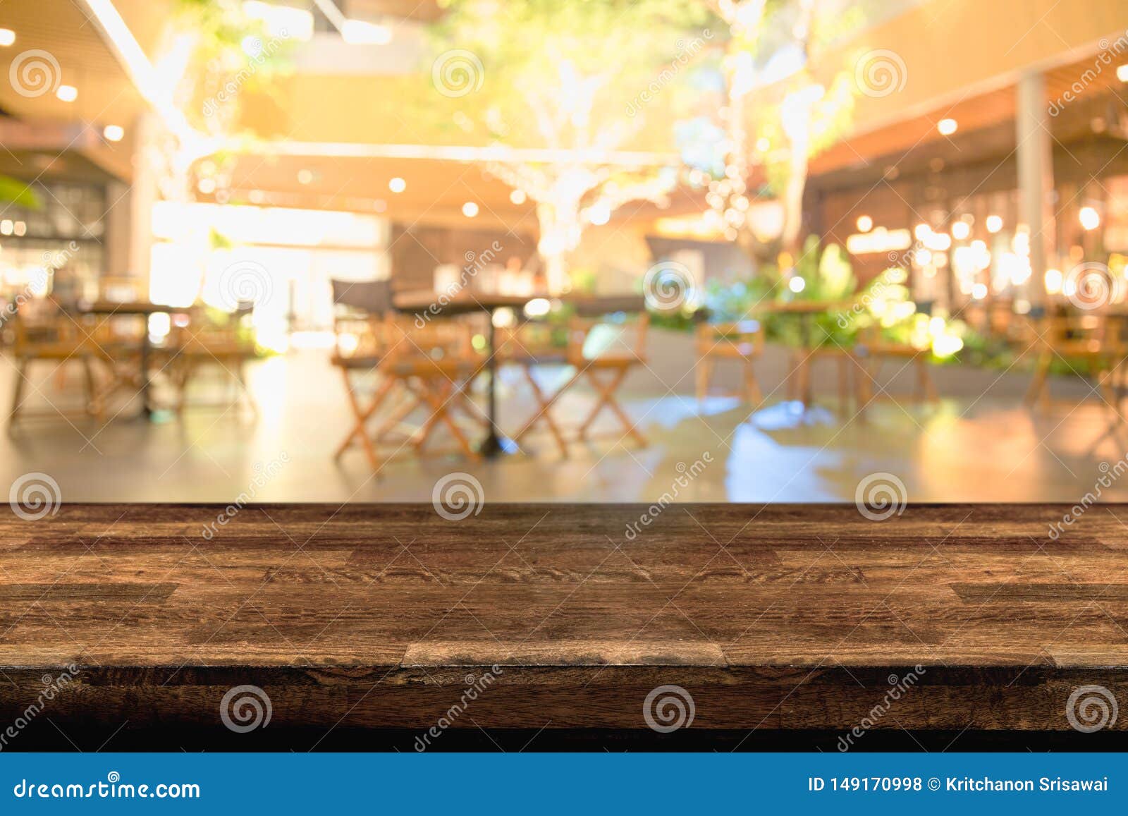 Empty Wood Table Top and Blur of Night Pub or Restaurant Background ...