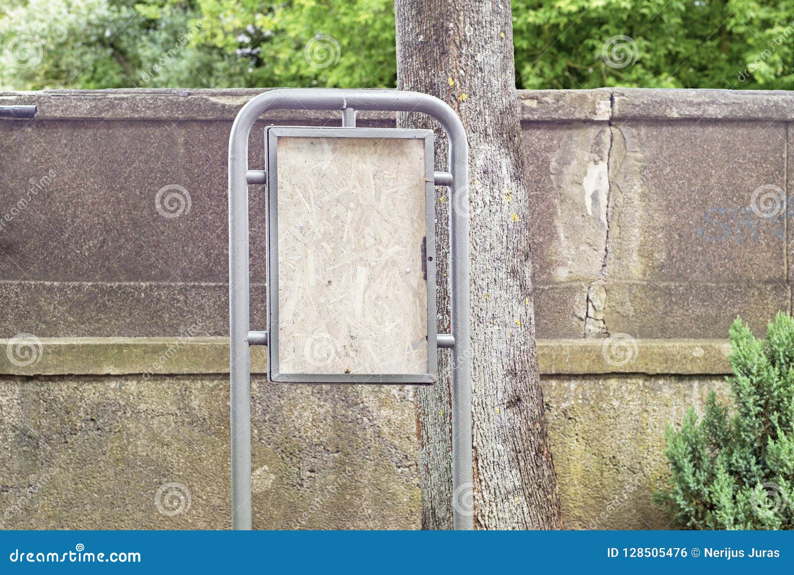 Empty Wooden Ad Board Near the Monolith Wall. Stock Photo - Image of ...