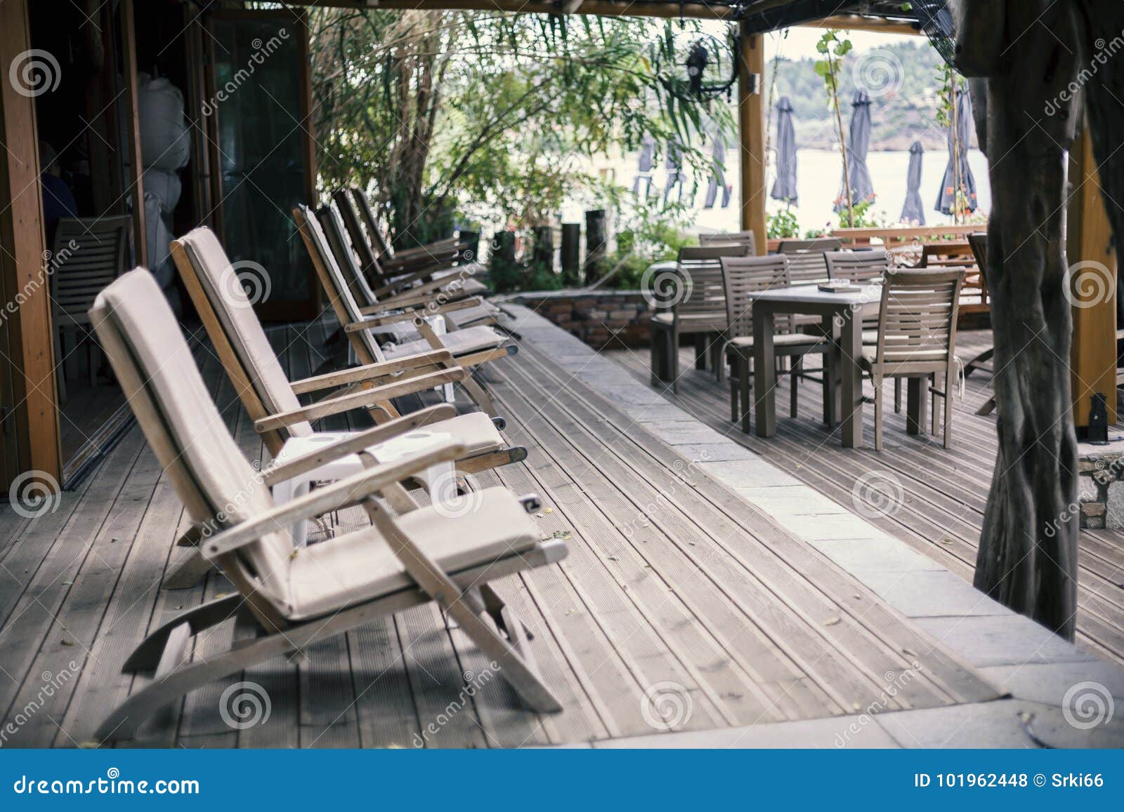 Empty wooden chairs stock photo. Image of outdoor, white - 101962448