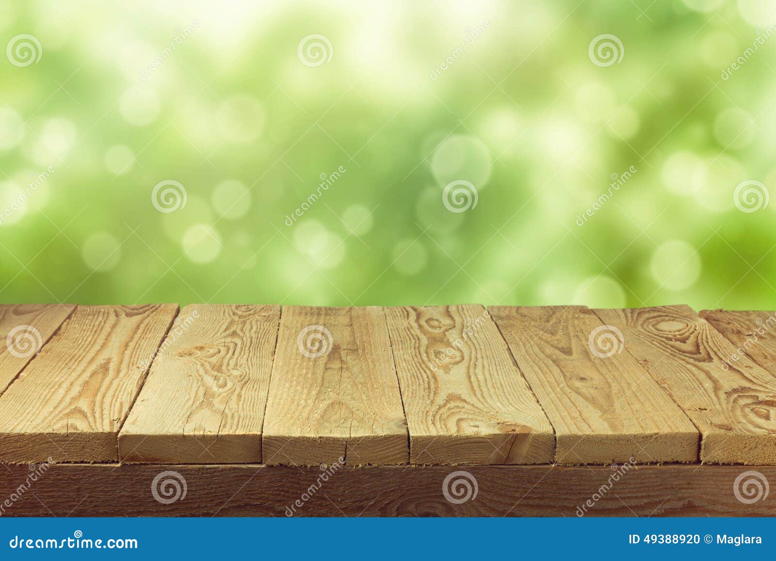 Empty Wooden Deck Table with Foliage Bokeh Background. Ready for ...