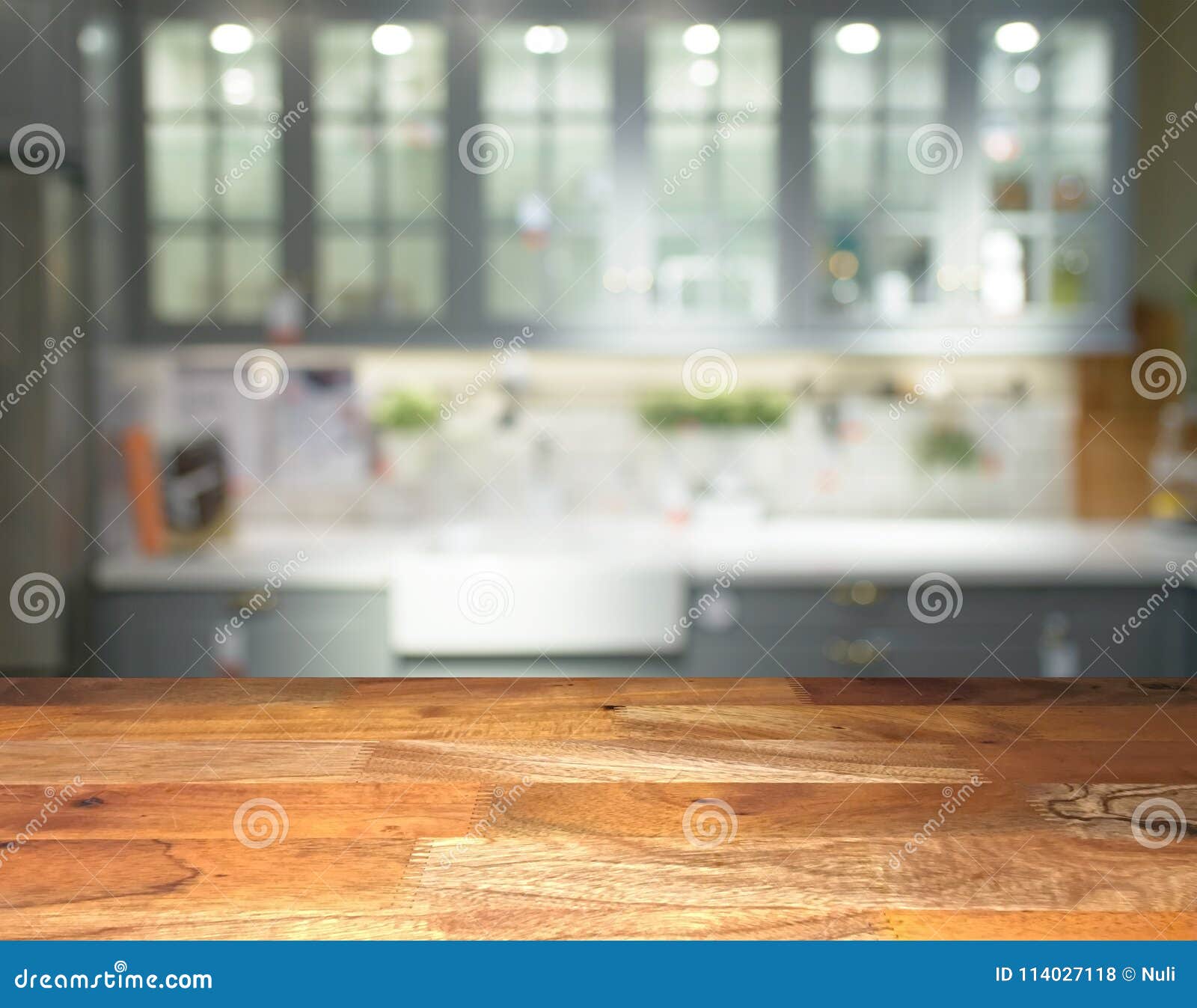 Empty Wooden Display Table Top Front with Blurred Kitchen on Background ...