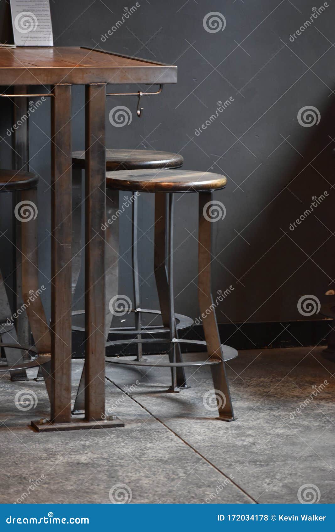 Empty Bar Stools Pulled Up To the Table Stock Photo - Image of ...