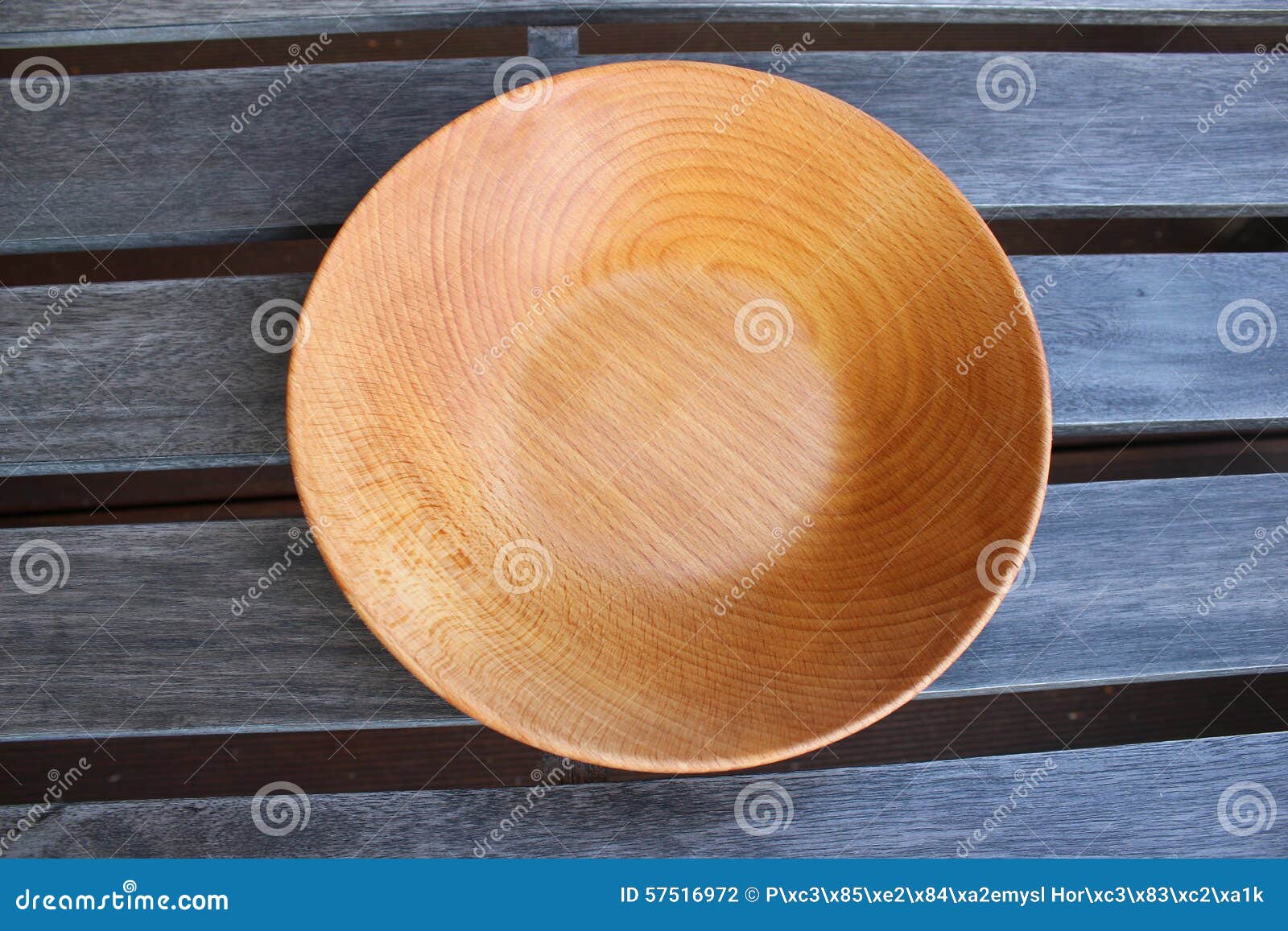 Empty wooden plates stock photo. Image of accessories - 57516972