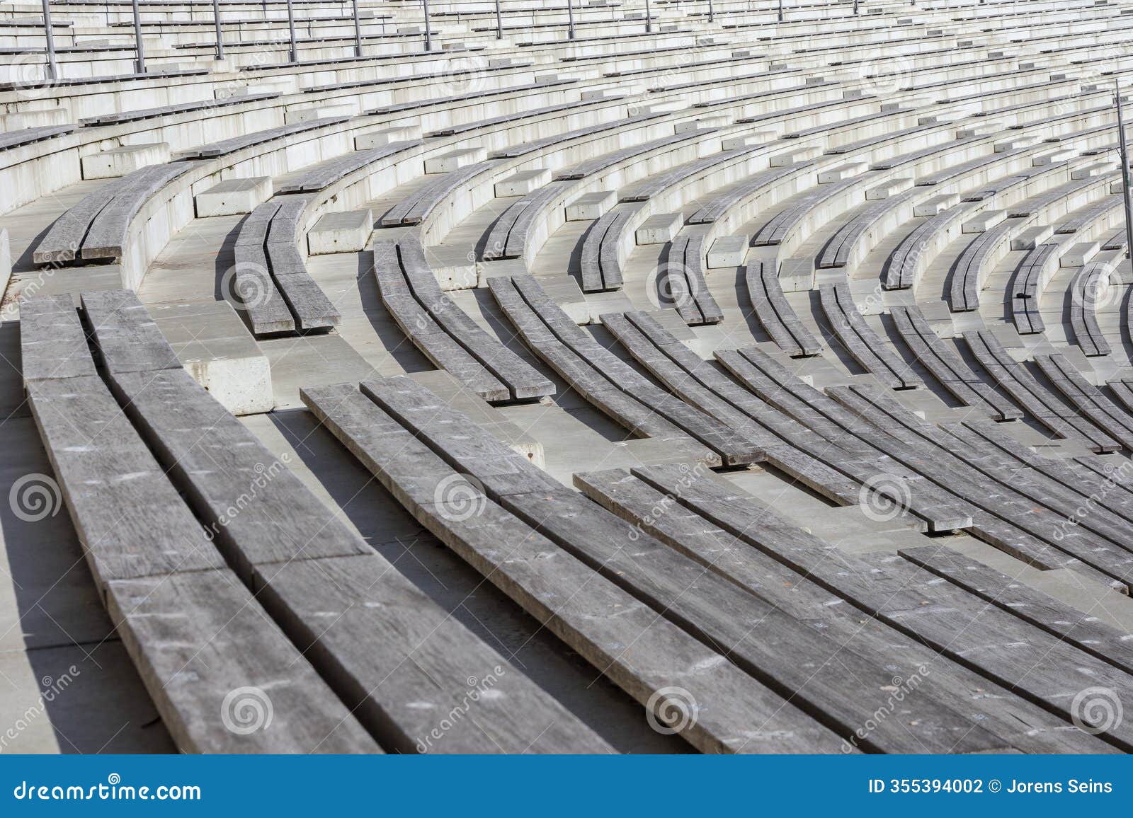 .an Empty, Wooden-seated Amphitheater with Concrete Structures Stock ...