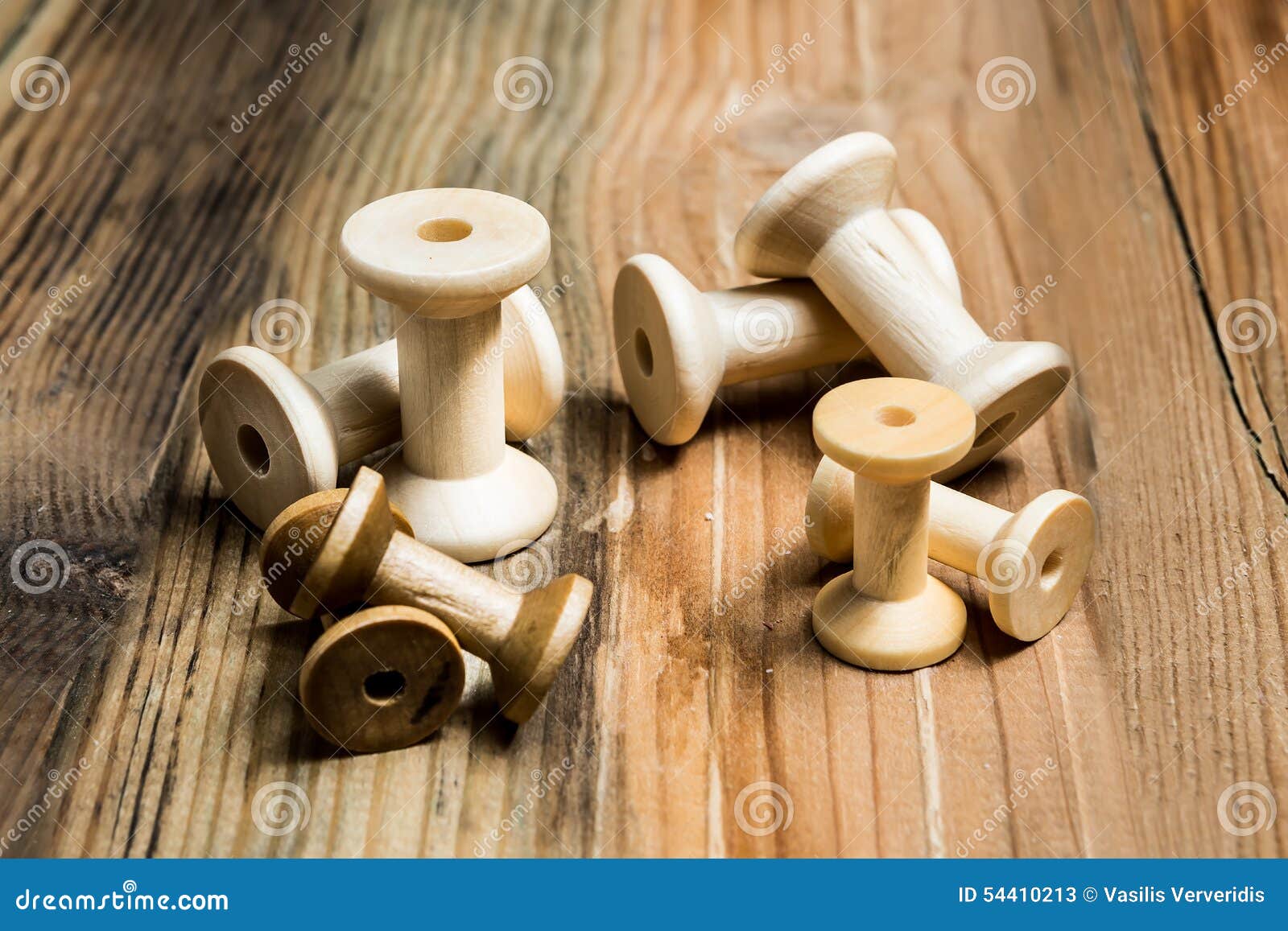Empty Wooden Sewing Spools on Old Wood Background Stock Image - Image ...