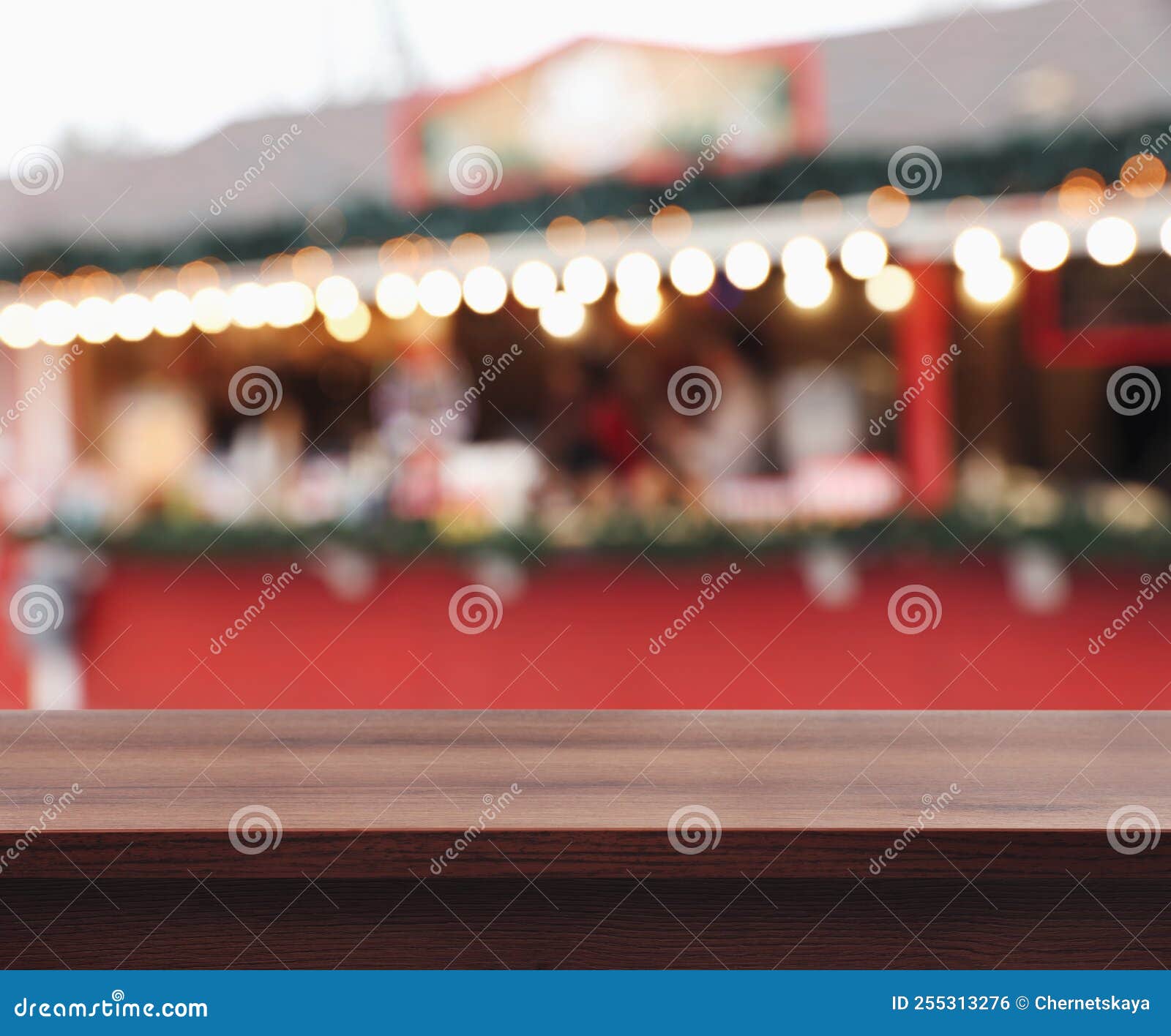 Empty Wooden Surface and Blurred View of Christmas Fair Stall Outdoors ...
