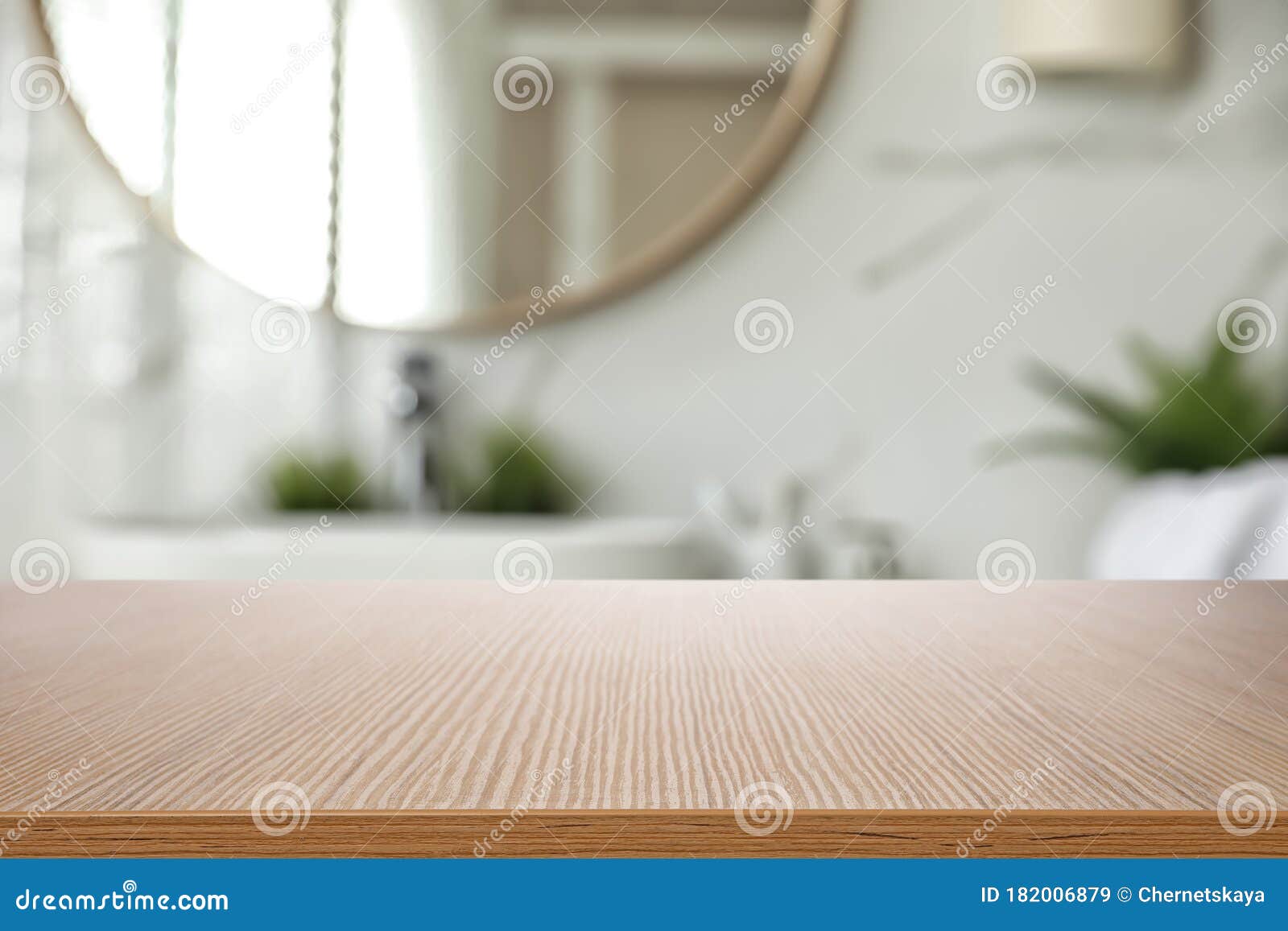 Empty Wooden Table and Blurred View of Bathroom Interior Stock Image ...