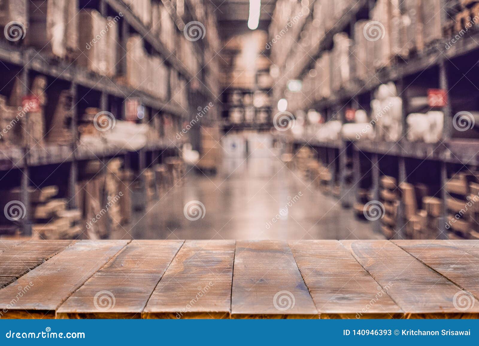 Empty Wooden Table on Defocused Blurred Boxes on Rows of Shelves Stock ...