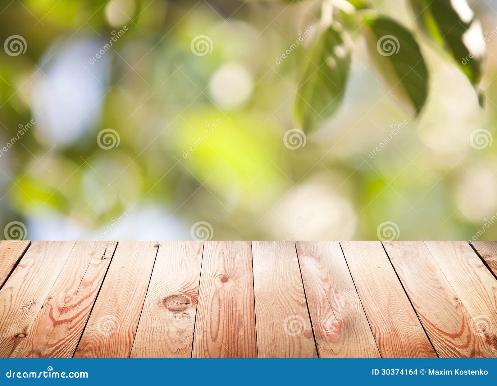 Empty Wooden Table with Foliage Bokeh Background. Stock Photo - Image ...