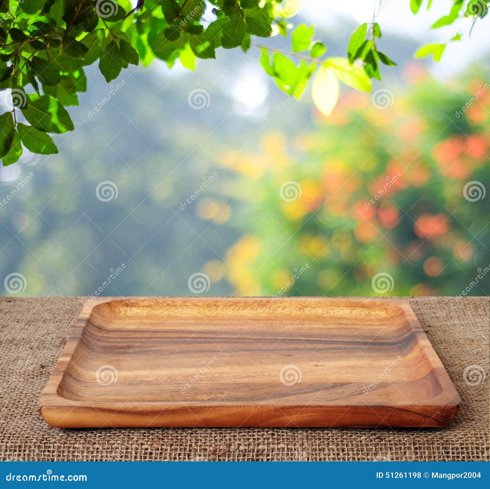 Empty Wooden Tray on Table Over Blur Trees Background Stock Photo ...