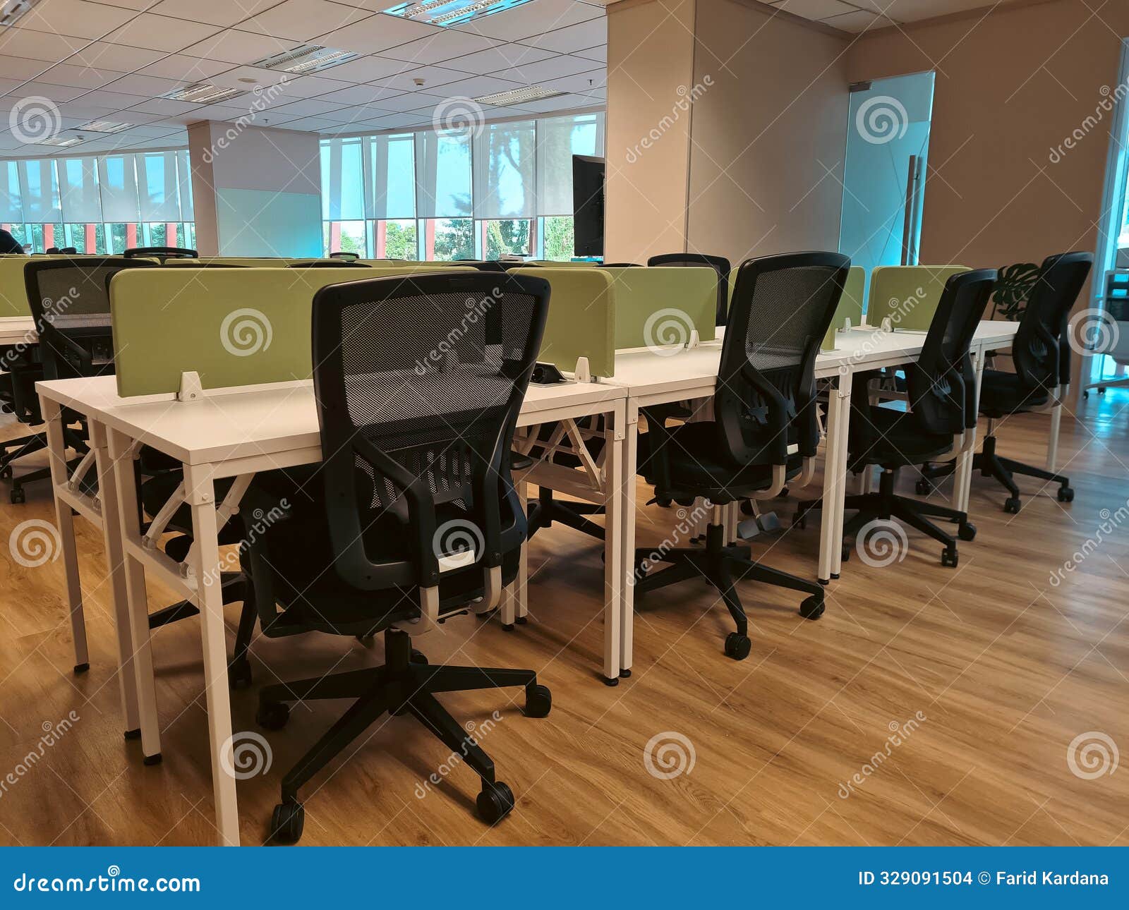 Empty Workplace at Modern Office with Small Green Cubicle Separating ...