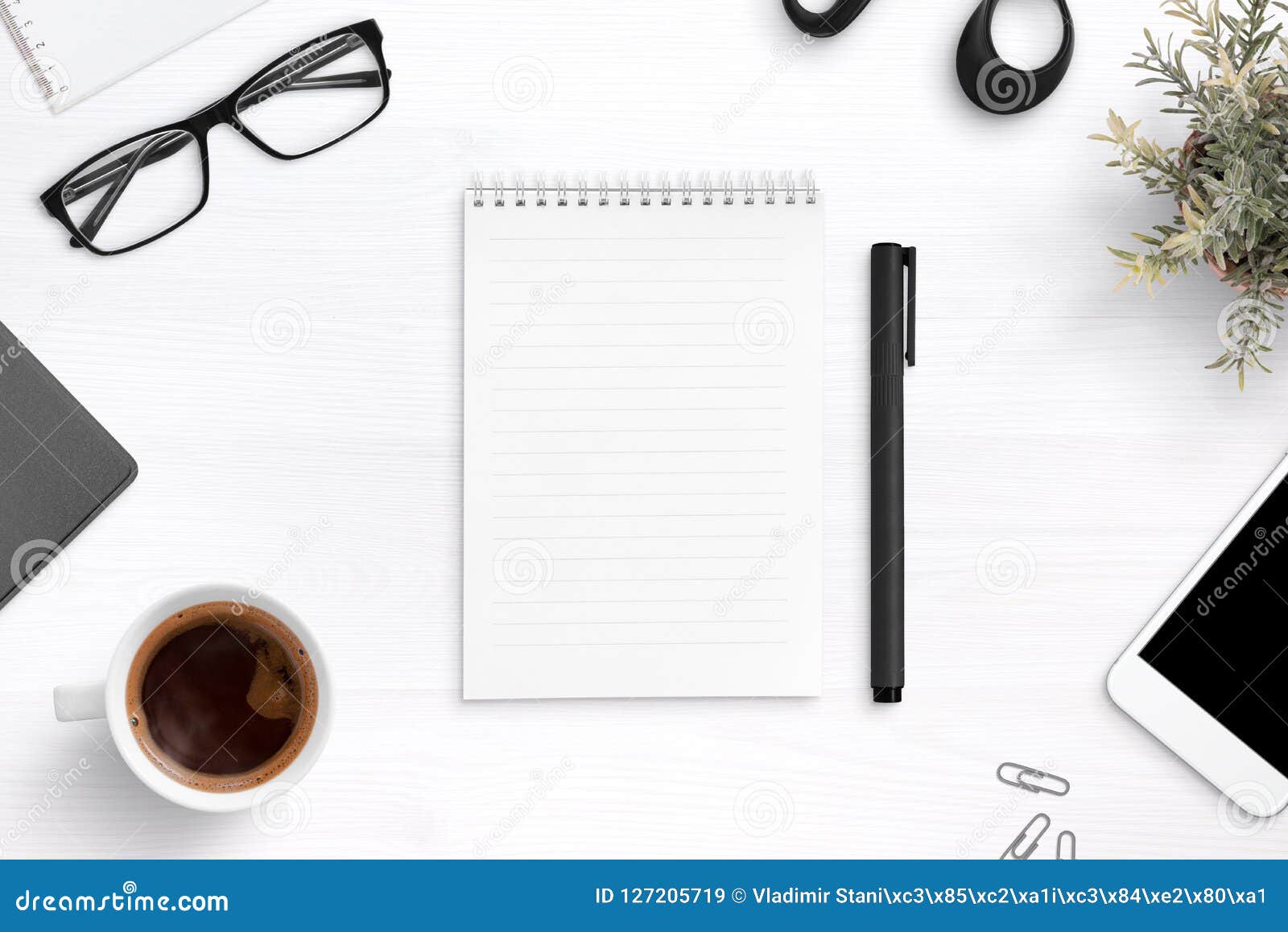 Empty Writing Pad on Office Desk Surrounder with Office Supplies Stock ...