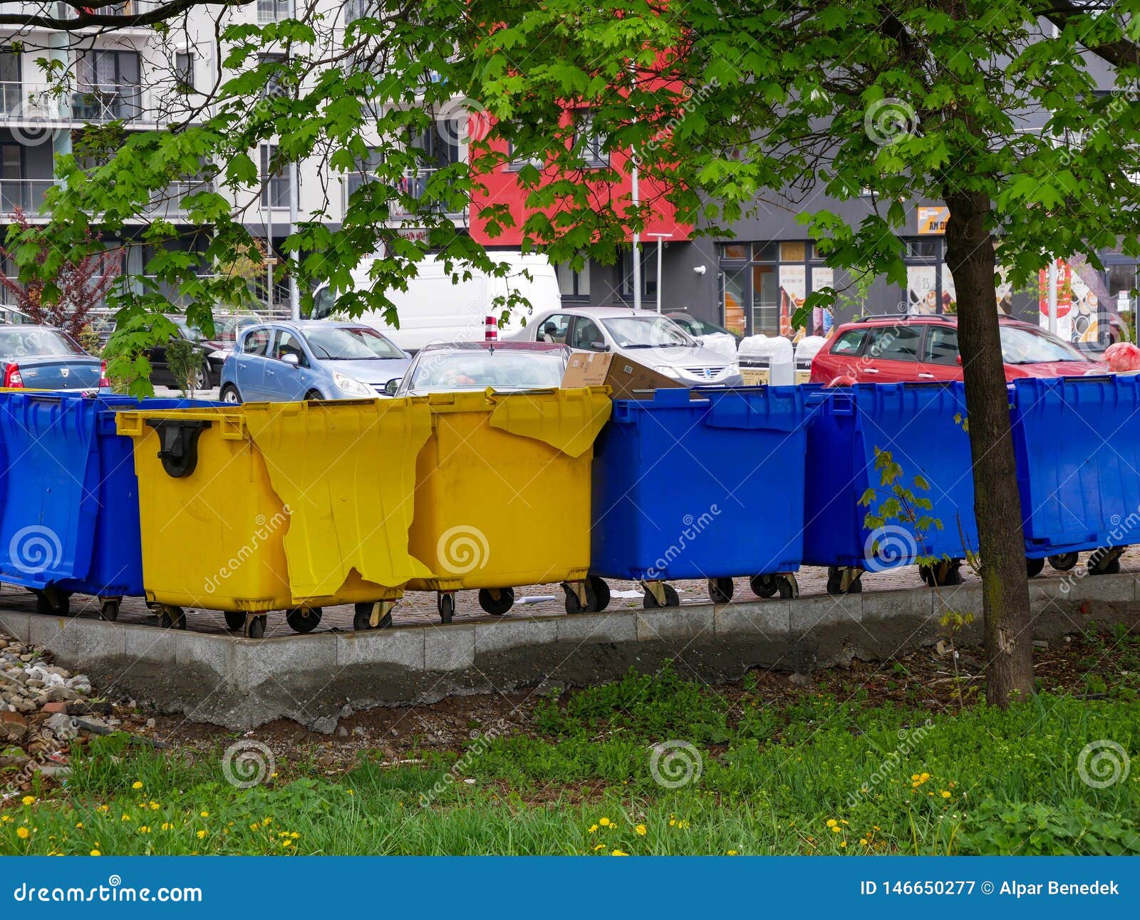 Empty Yellow and Blue Plastic Trah Containers. Editorial Photography ...