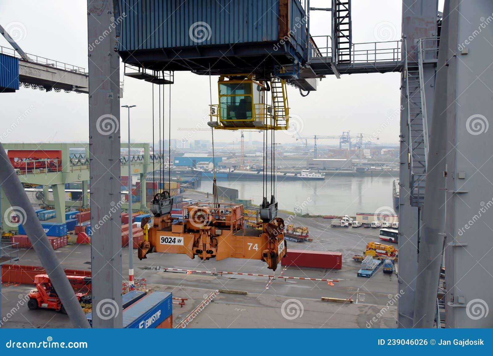 Empty Yellow Control Cabin and Orange Spreader of Gantry Crane ...