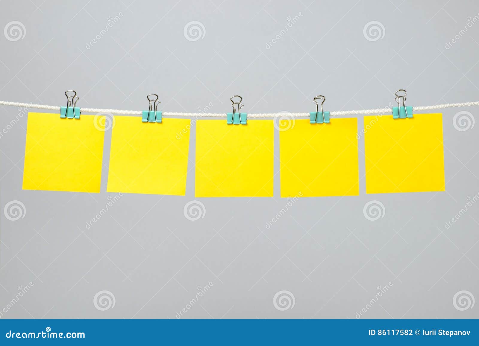 Empty Yellow Paper Notes Hanging on the String Stock Photo - Image of ...