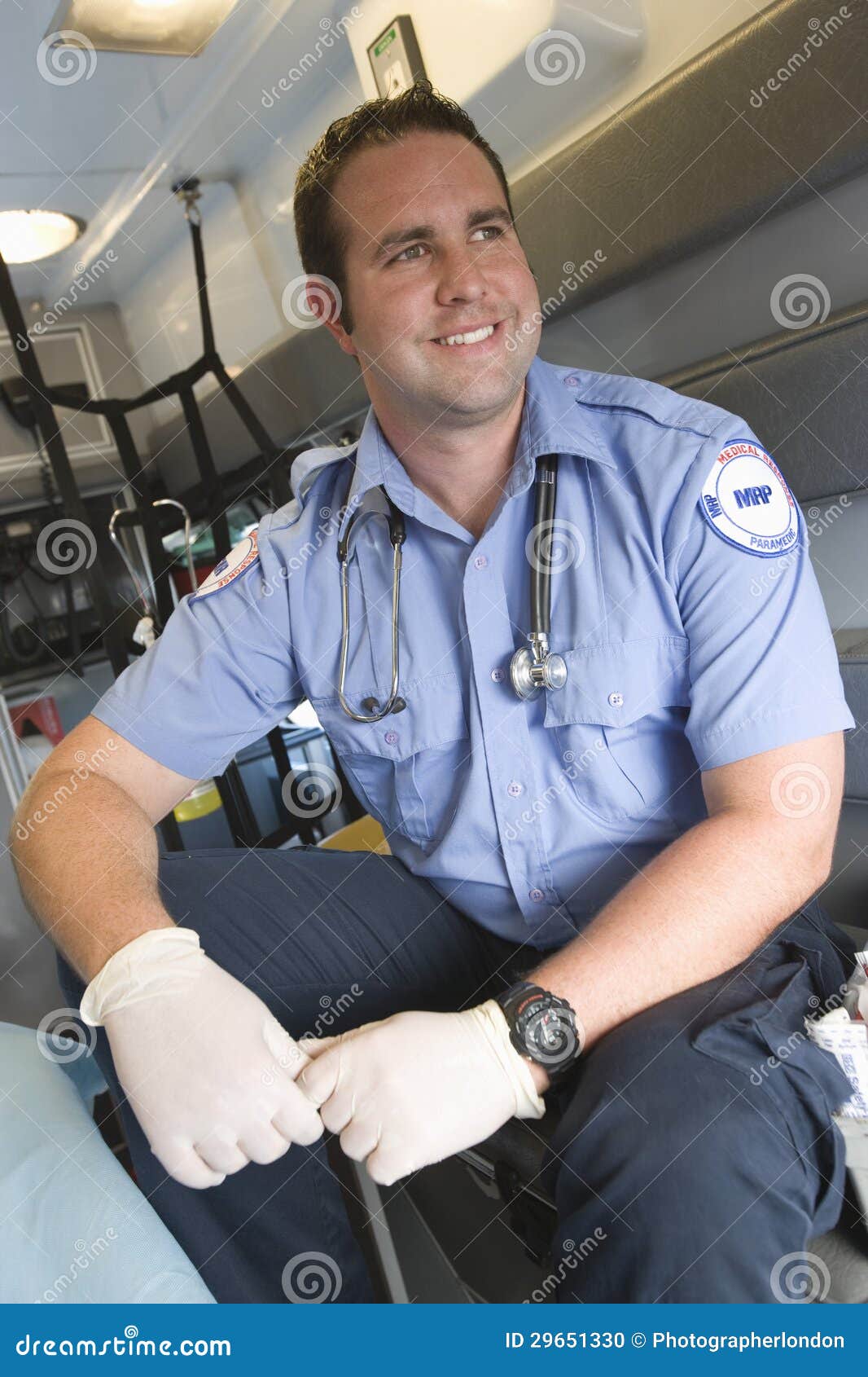 EMT Doctor Sitting in Ambulance Stock Photo - Image of vehicle ...