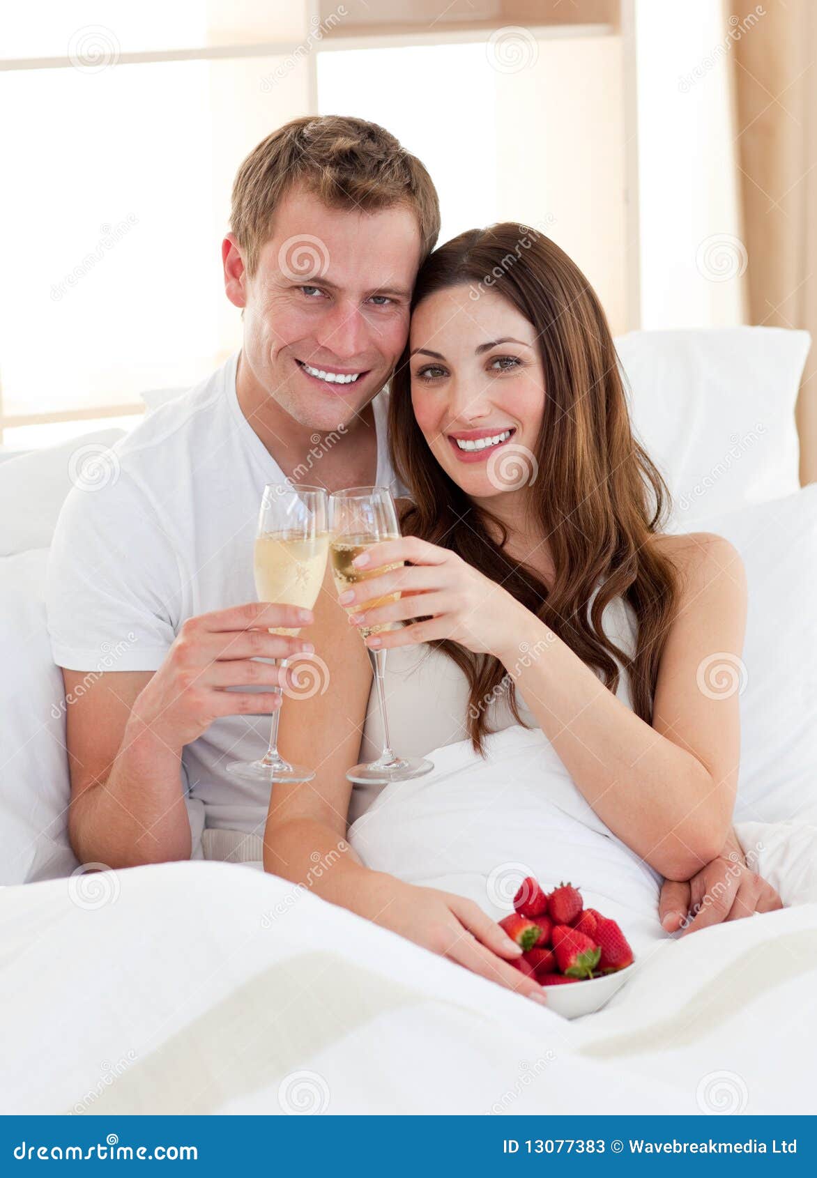 Enamored Couple Hugging Lying In Their Bed Royalty-Free Stock ...