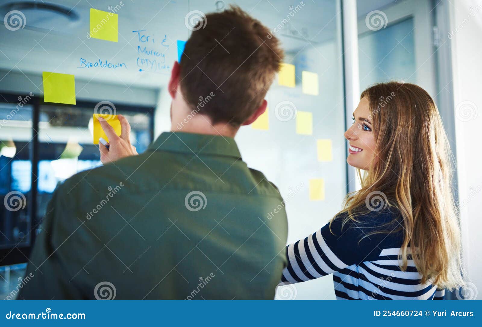 Encouraging Creativity with Her Colleague. Colleagues Having a ...