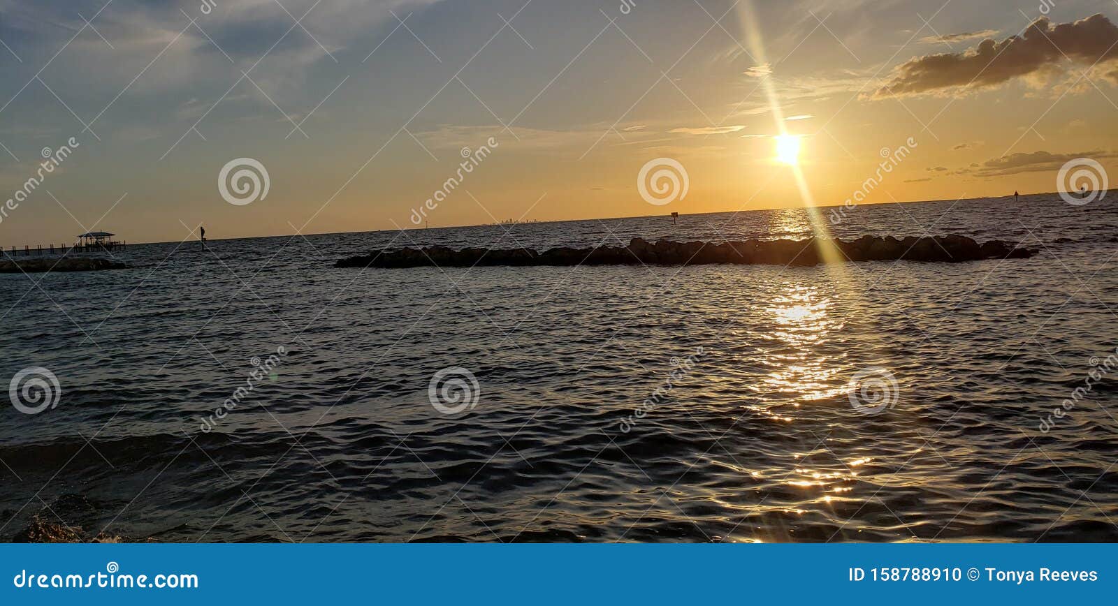At the end of the day stock photo. Image of sunset, water - 158788910