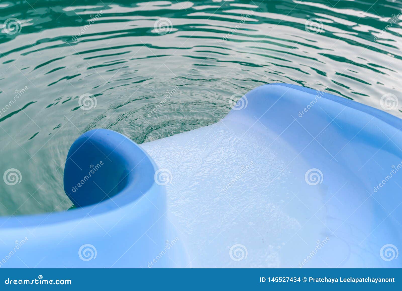 The End Exit of Blue Water Slides in a Water Park Stock Photo - Image ...