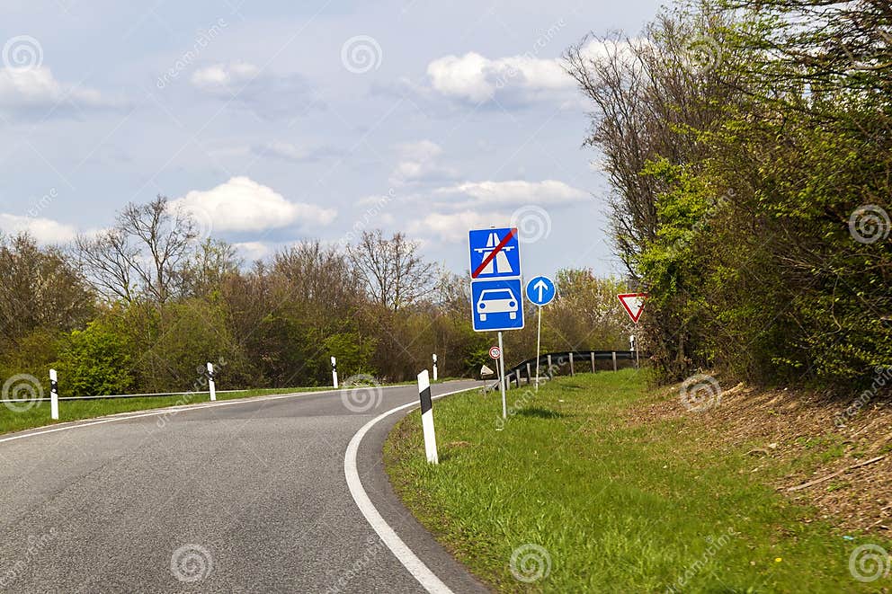 End of Freeway Sign on the Side of the Road Stock Photo - Image of ...