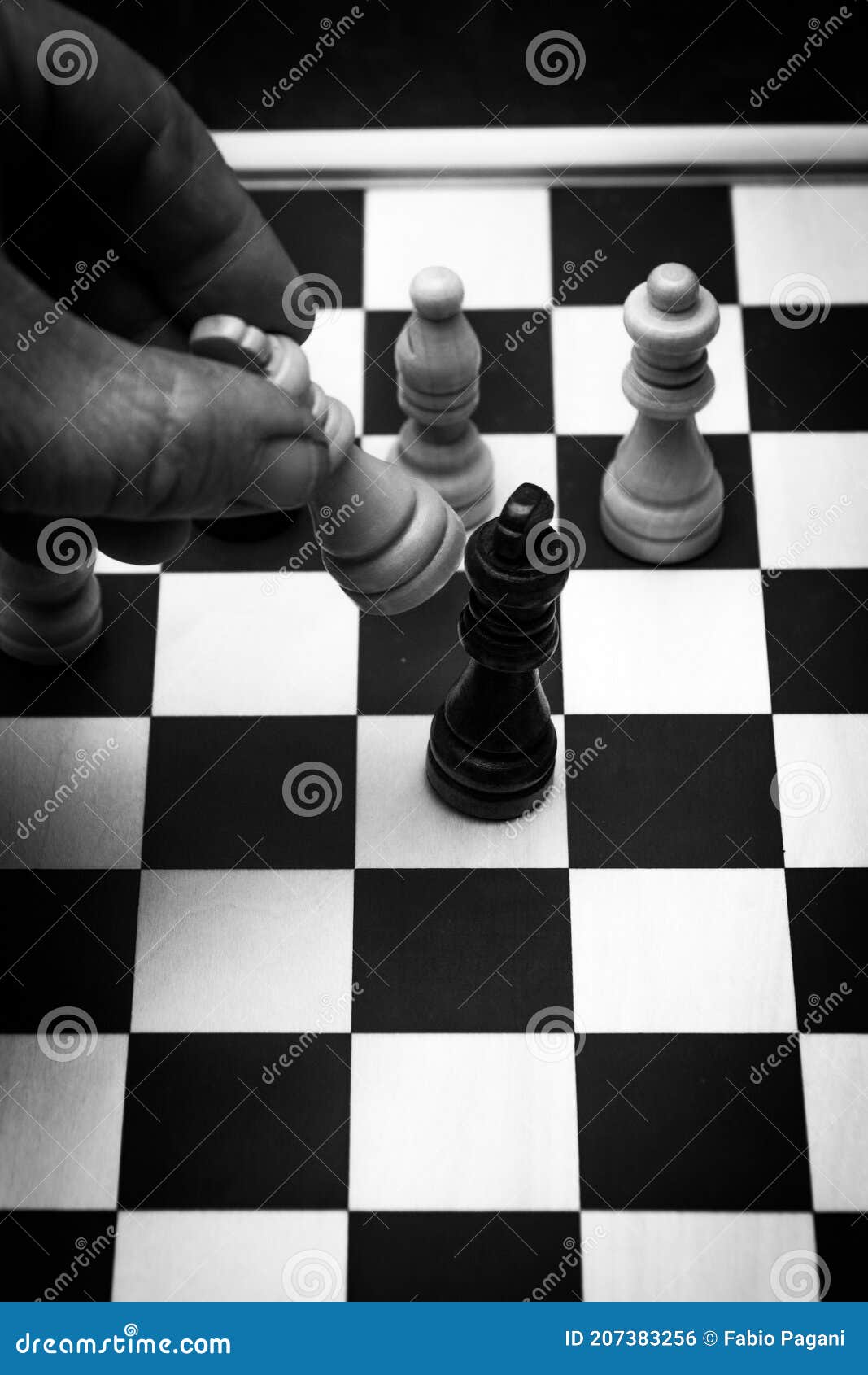 Human hand on chess board stock photo. Image of mind - 207383256