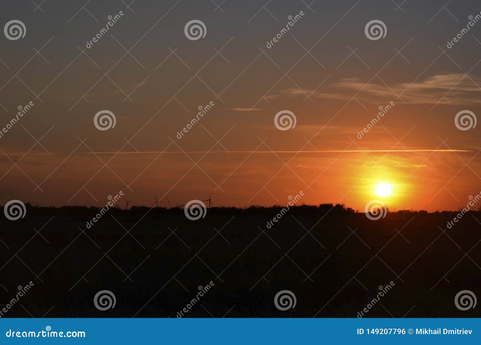 Thin White Line in the Sky. Sunset Stock Photo - Image of shrubs ...