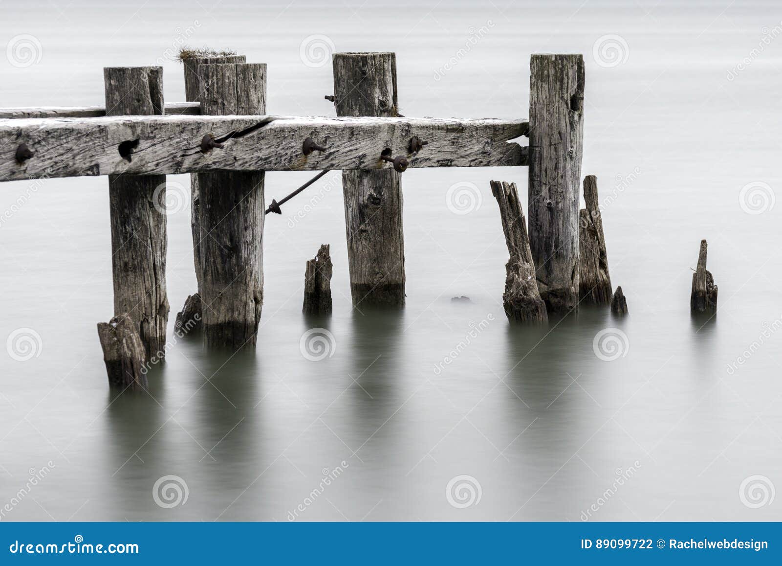 End of an Old Broken Pier, Closeup of Posts Standing in Calm Tranquil ...