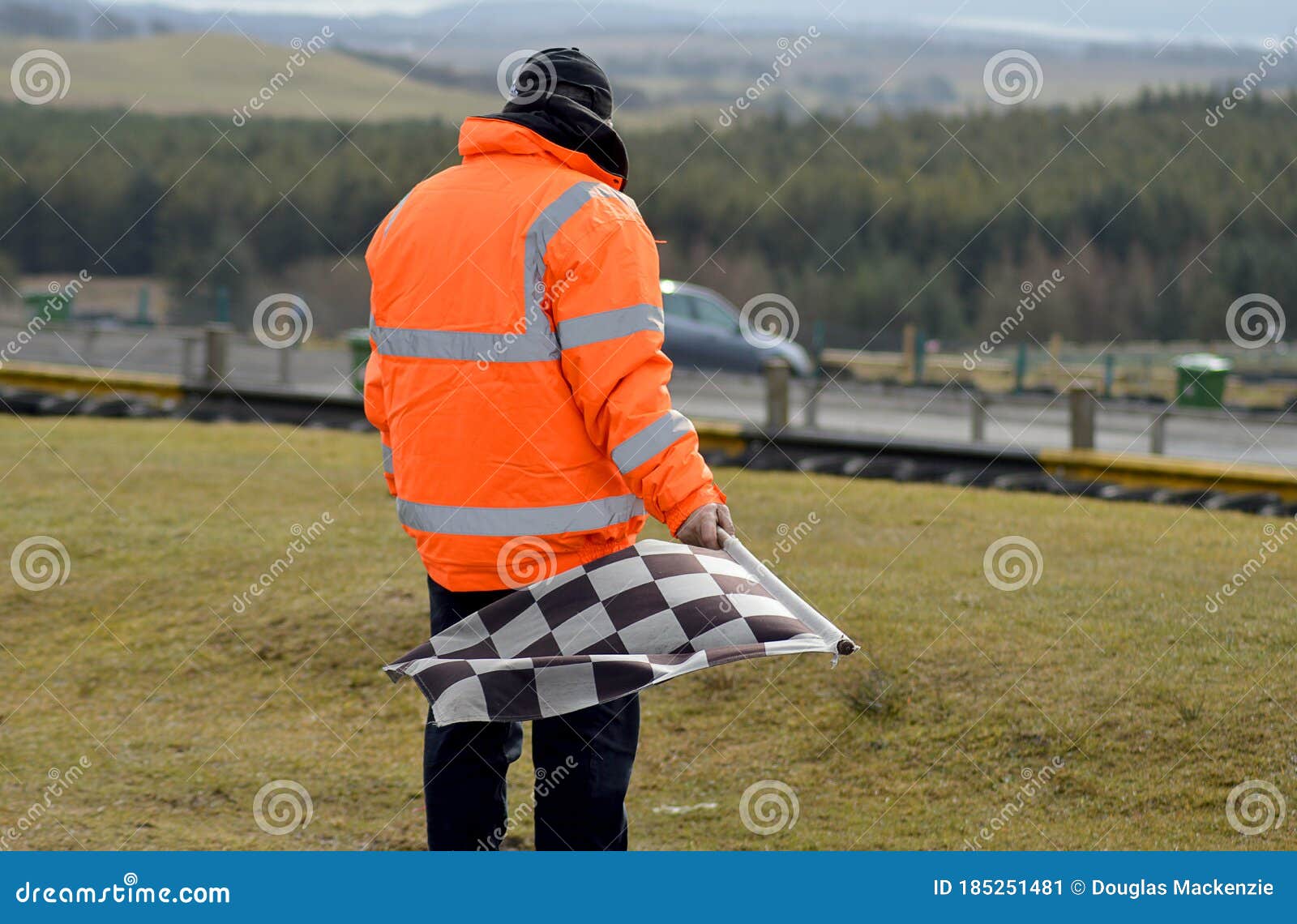 End of the Race - Marshal with Chequered Flag Stock Image - Image of ...
