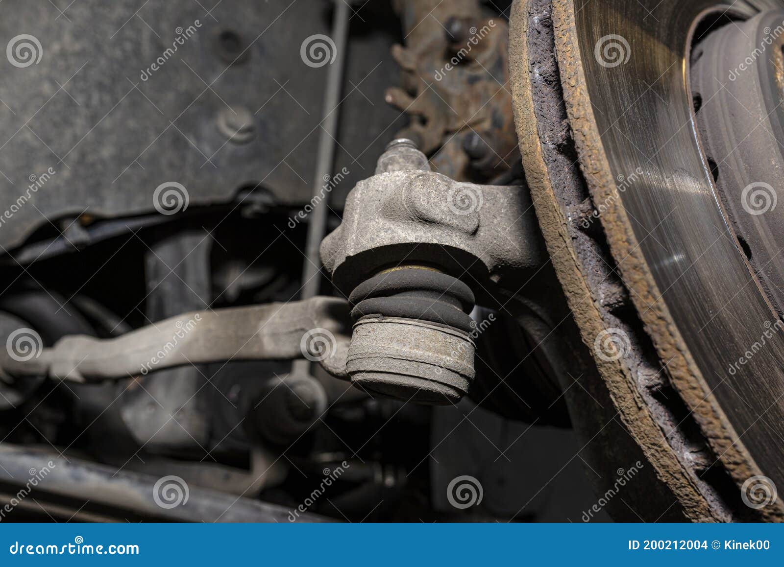 The End of the Tie Rod Ends with a Rubber Connector, the Brake Disc is ...