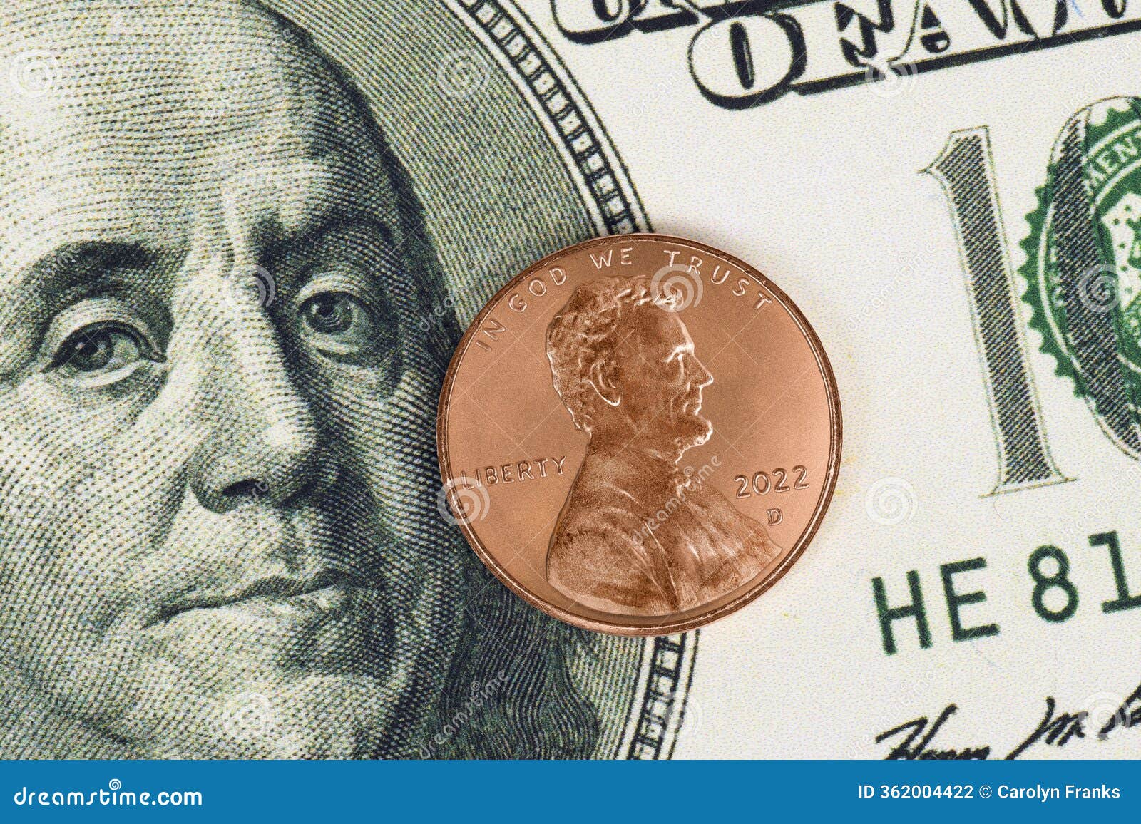 Endangered Penny On Top Of Franklin Hundred Dollar Bill Stock ...