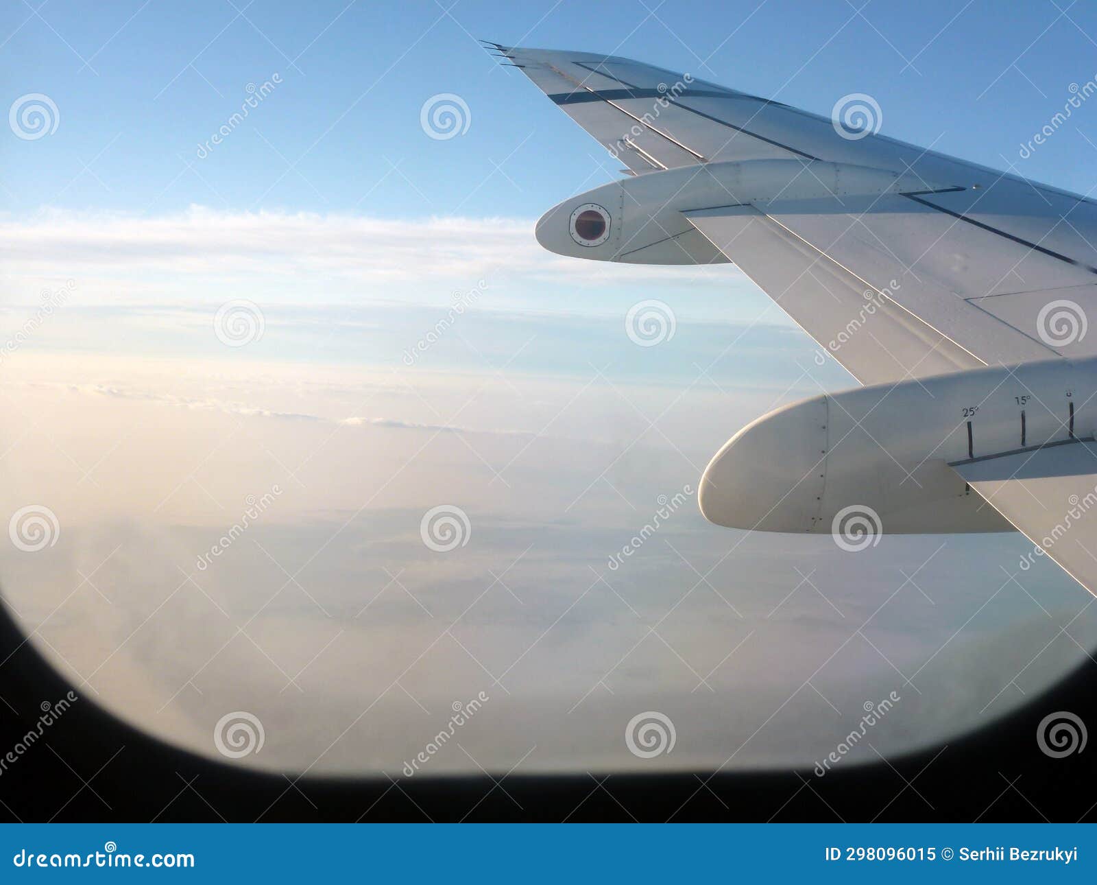 Endless Clouds and Blue Sky Under the Wing of the Plane Stock Image ...