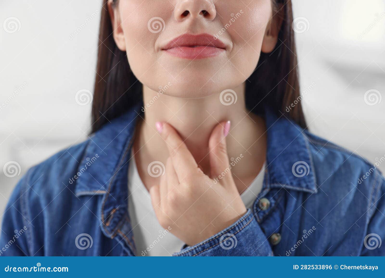 Endocrine System. Woman Doing Thyroid Self Examination Indoors, Closeup ...