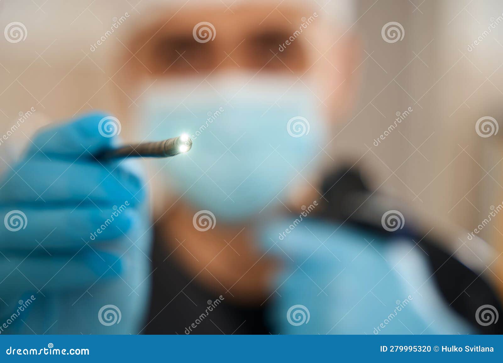 Endoscopist in Face Mask and Nitrile Gloves Using Endoscopy Instrument ...