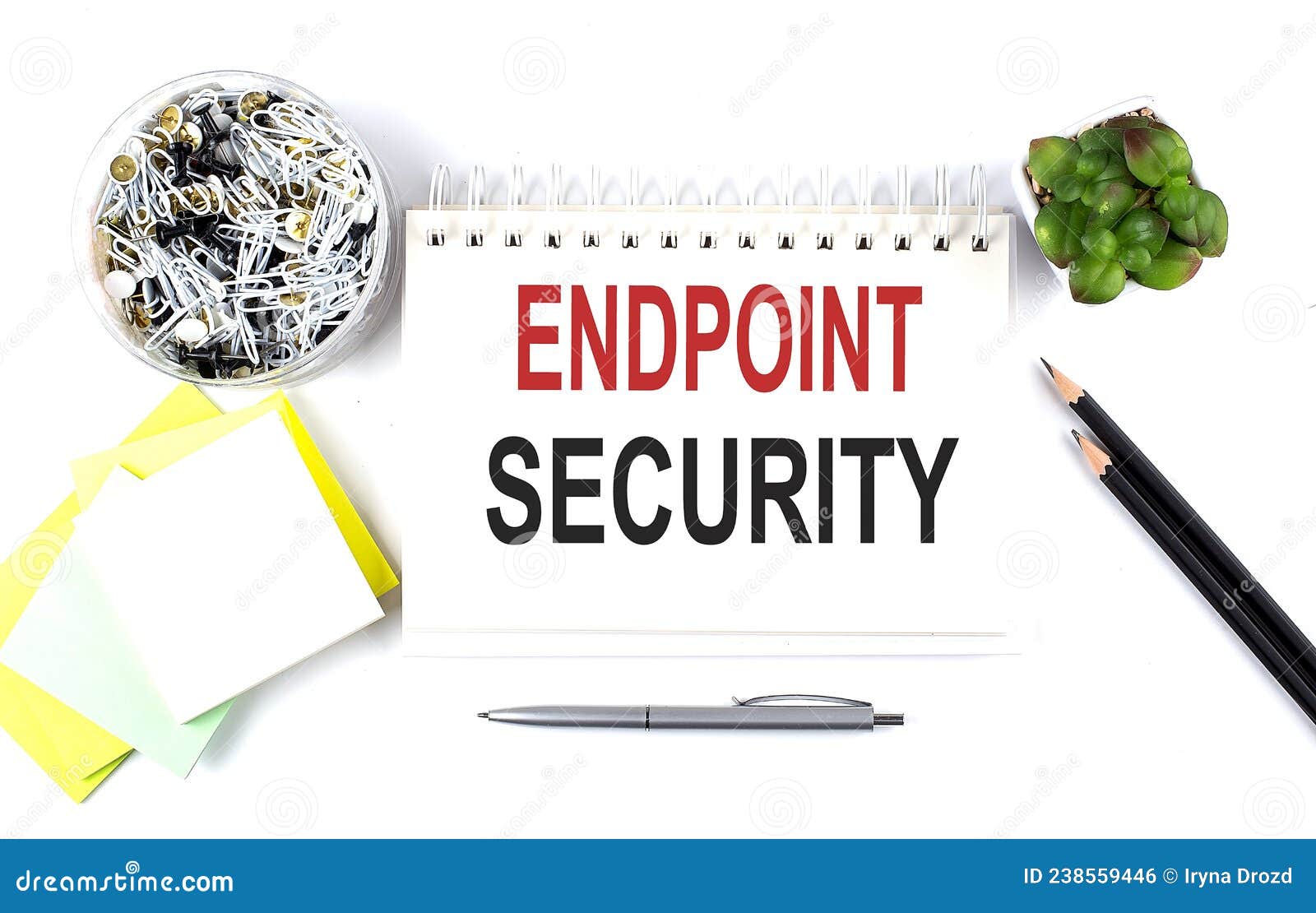 ENDPOINT SECURITY Text on Notebook with Office Supplies on White ...