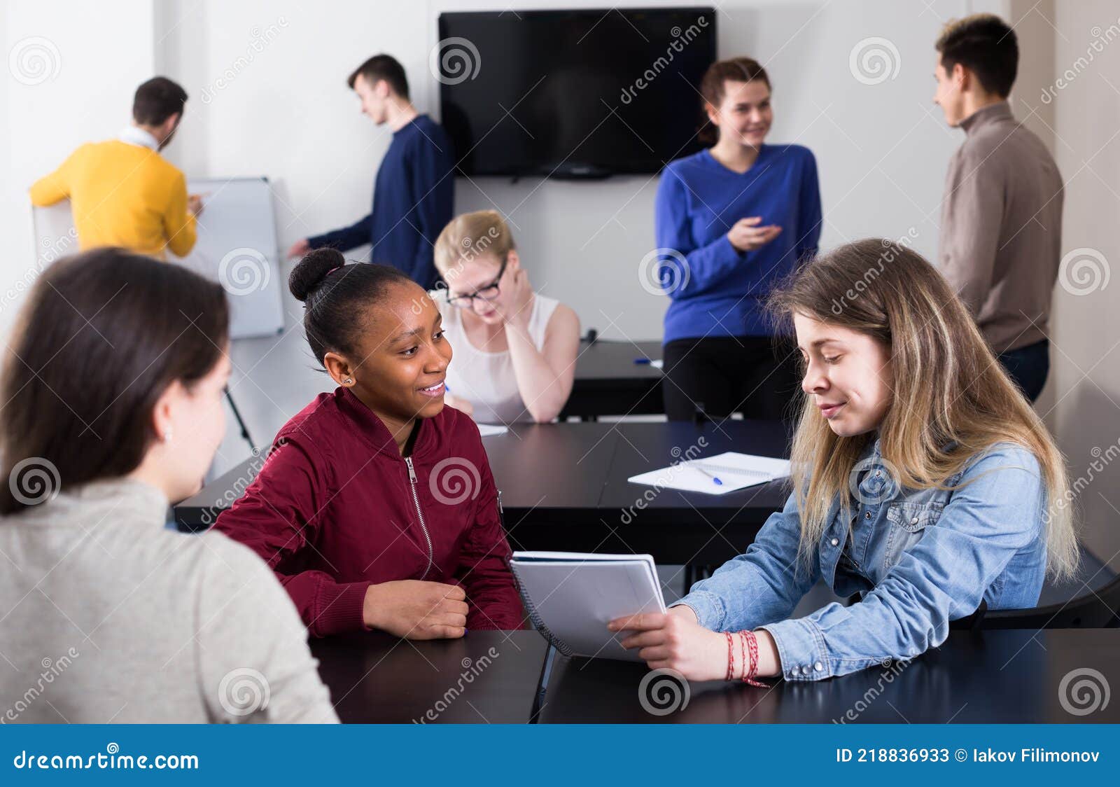 Energetic Boys and Girls Students Having Conversation at Recess Stock ... Energetic Boys and Girls Students Having Conversation at Recess Stock ...