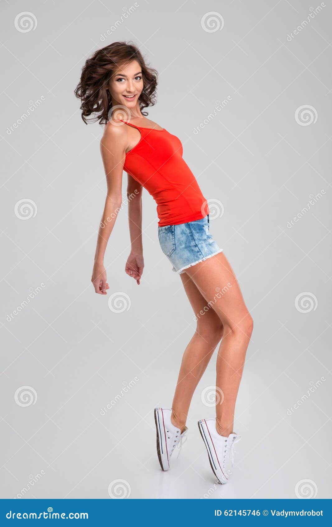 Energetic Dancing Young Woman in Motion Stock Photo - Image of ...