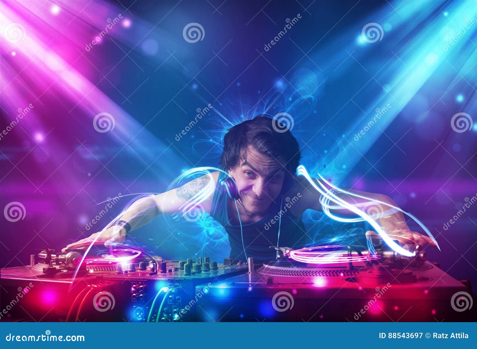 Energetic Dj Mixing Music with Powerful Light Effects Stock Image ...